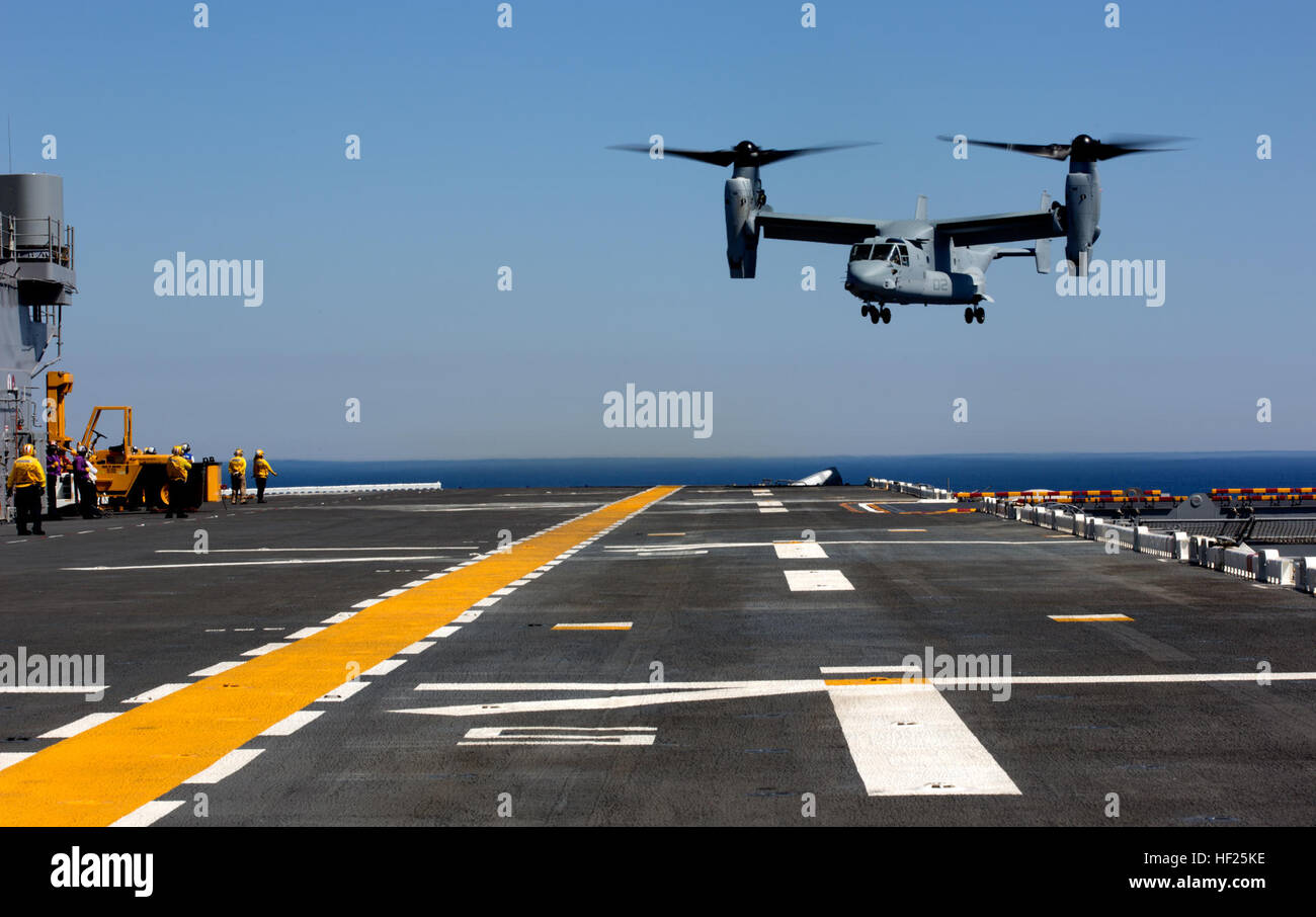 Pilots with Marine Medium Tiltrotor Squadron (VMM) 161 land an MV-22B ...