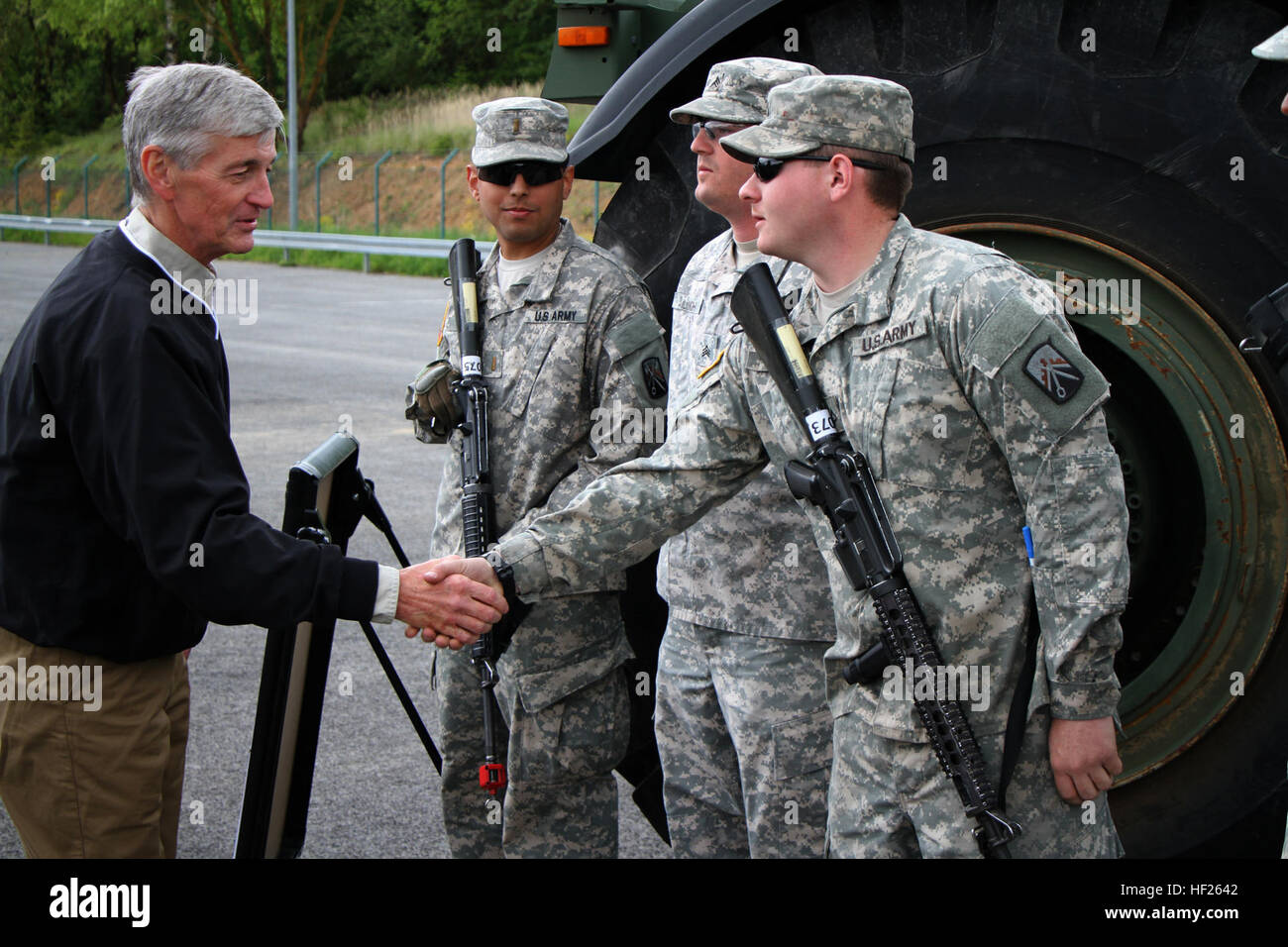 Soldiers from the 16th Sustainment Brigade discuss the RT-240 Rough ...