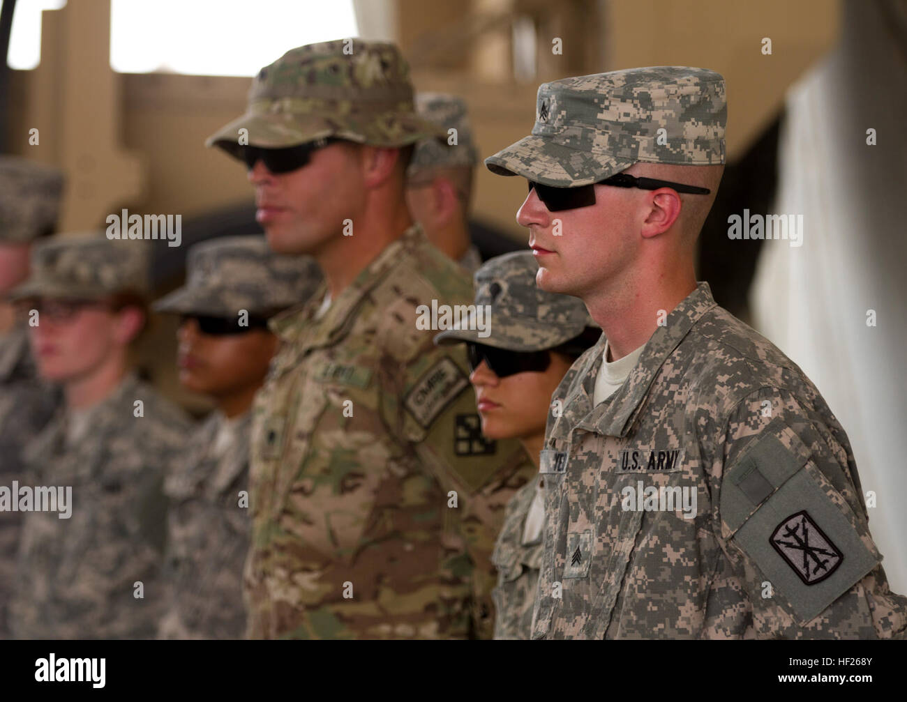 Soldiers from the 42nd Combat Aviation Brigade (CAB) assist in running ...
