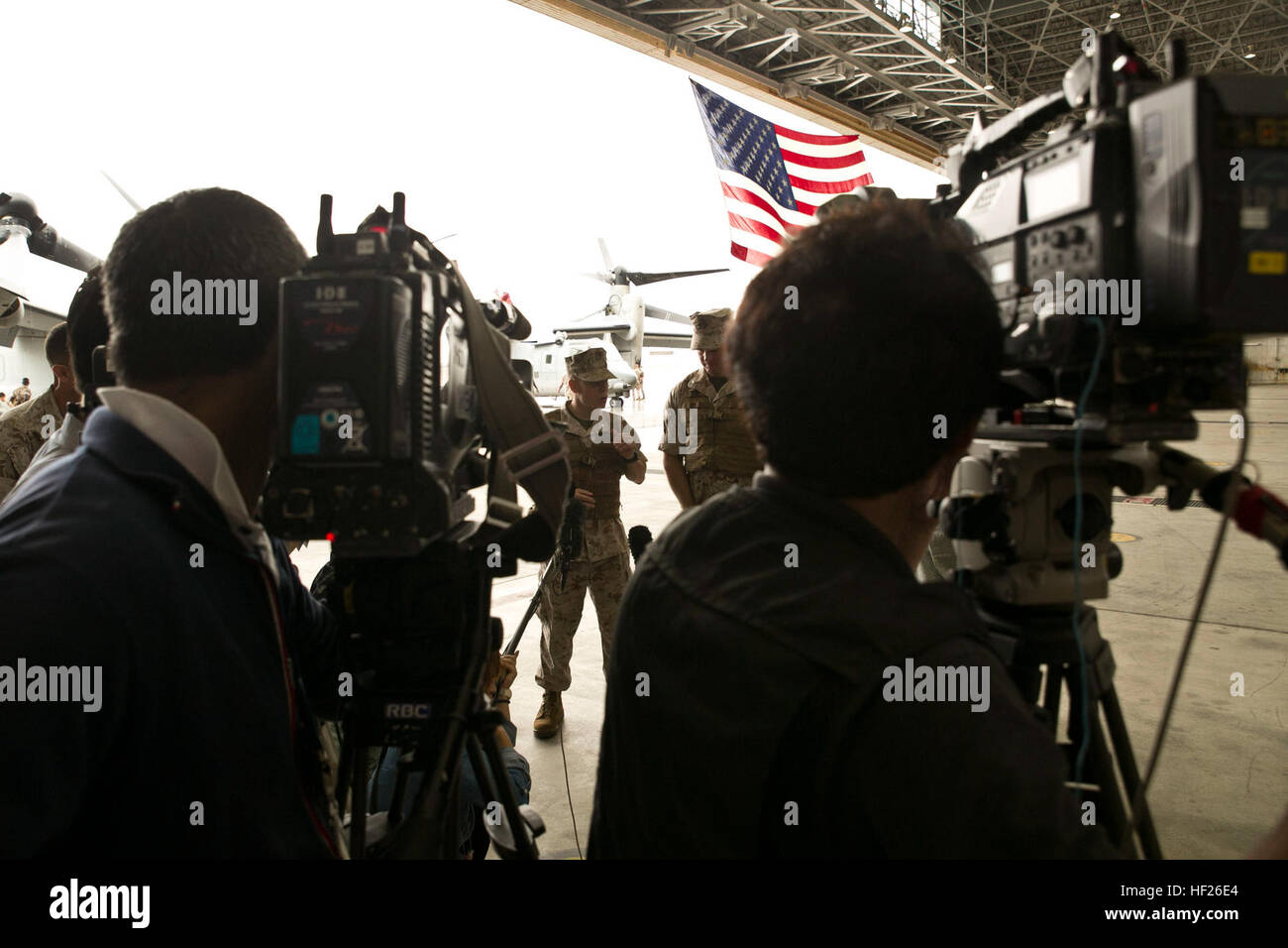 Lt. Col. Christopher M. Murray, center right, answers questions from ...