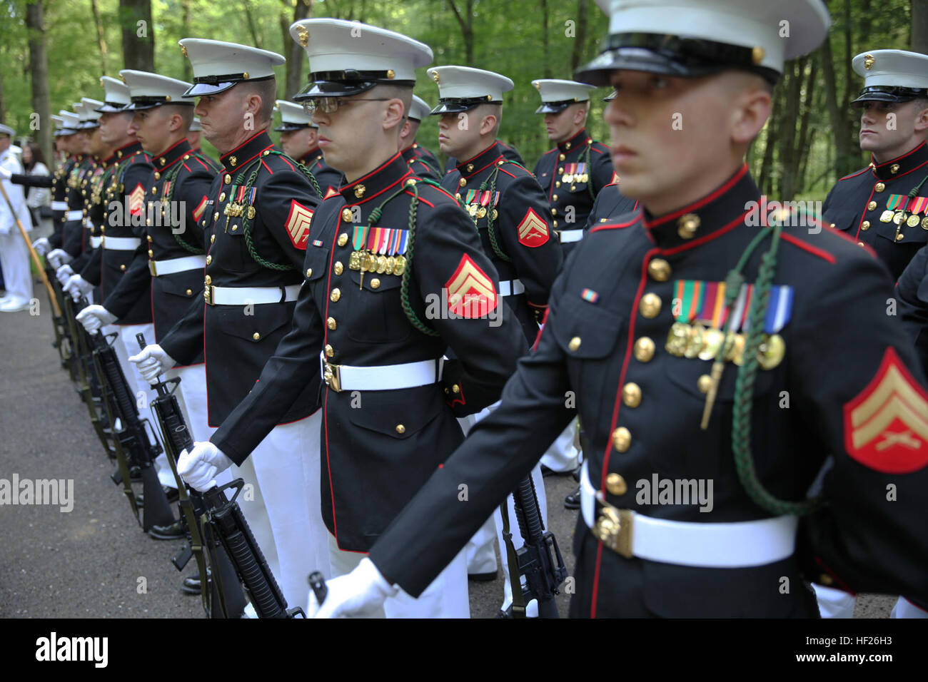 Marines from the 6th Marine Regiment stand in formation during the ...