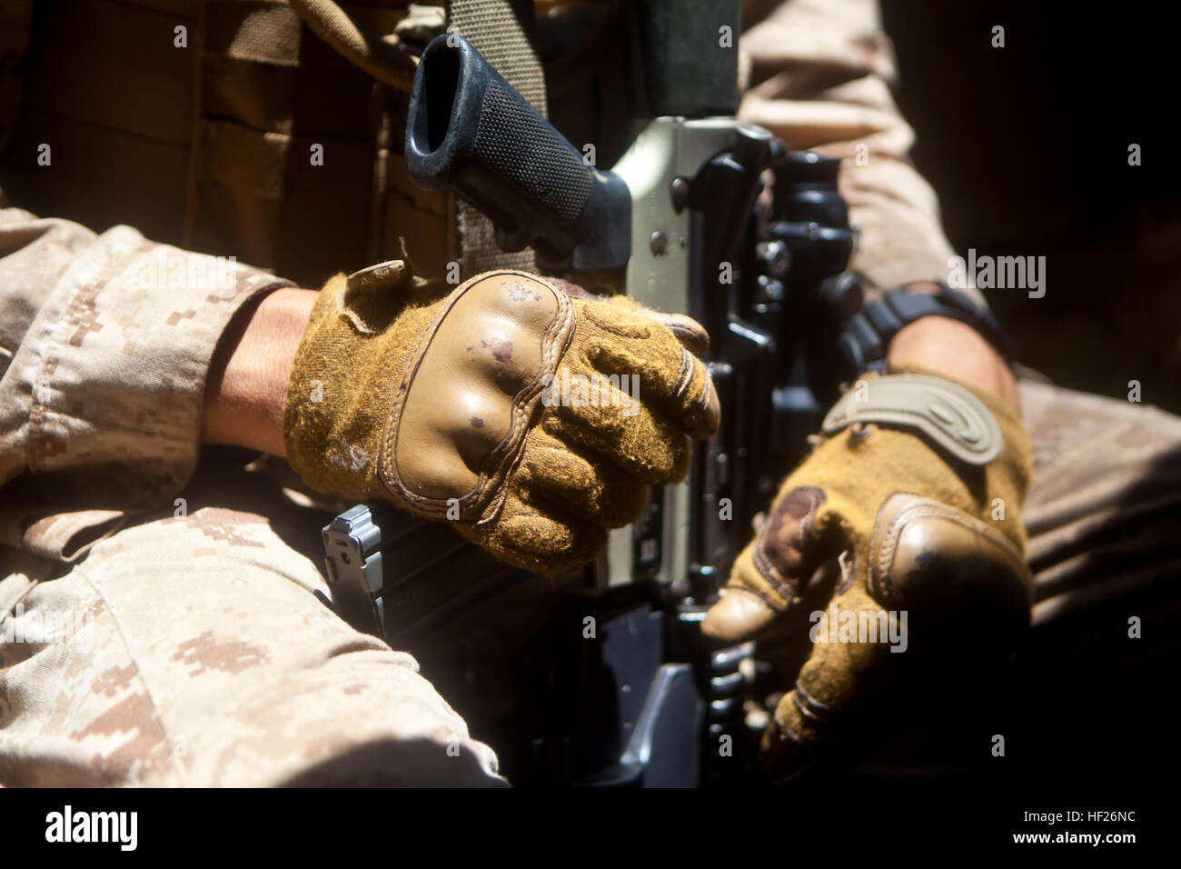 U.S. Marine Corps Pfc. Huberth Duarte, an M-203 gunner assigned to 2nd ...