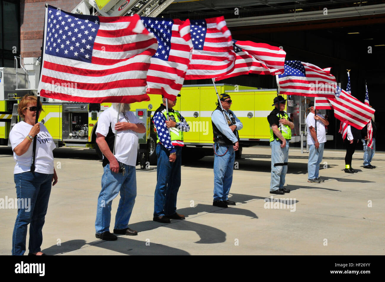 Members of the Patriot Guard Riders display U.S. flags at a deployment ...
