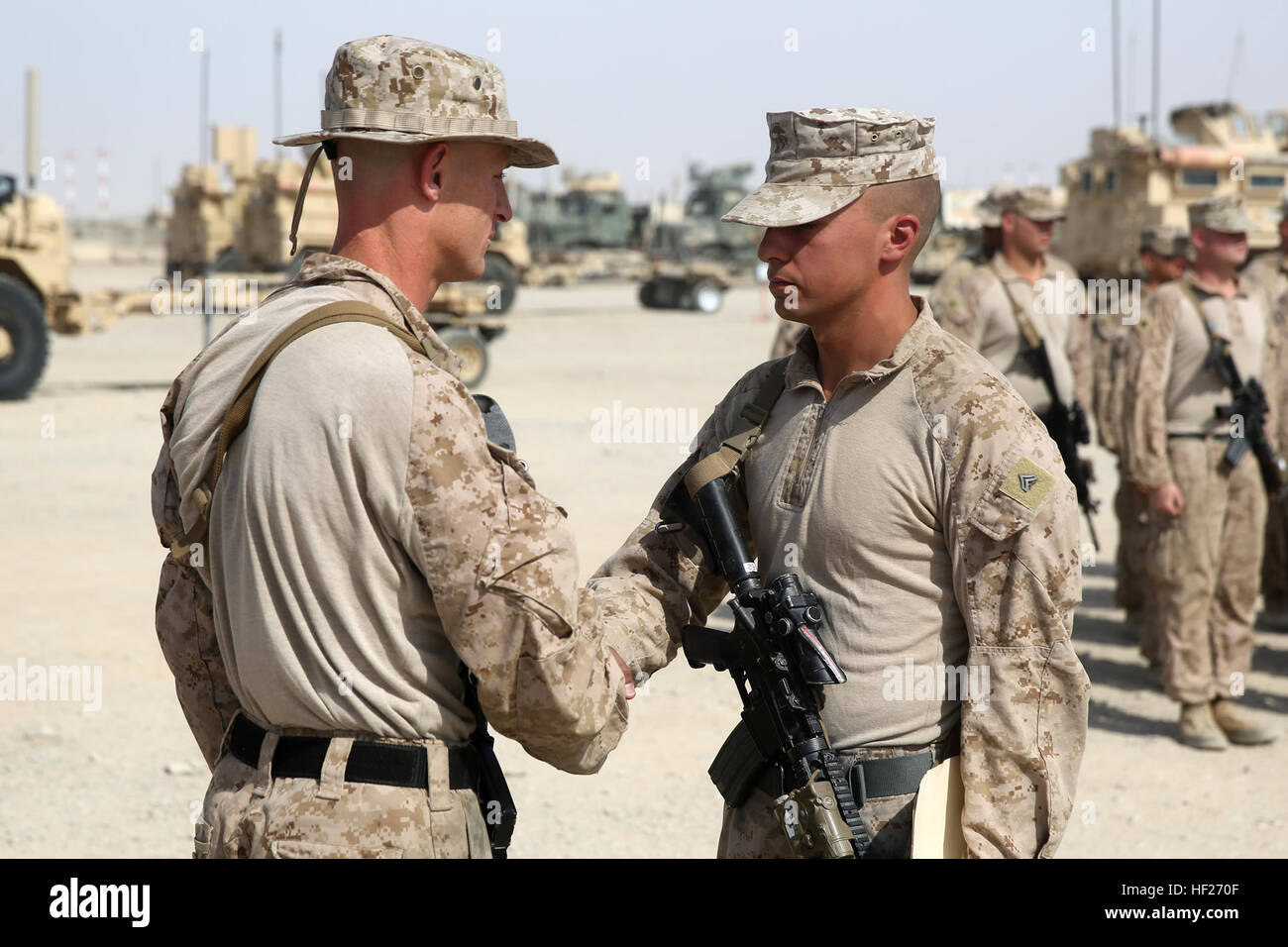 Corporal Jonathan Hollis, right, a native of Grand Rapids, Michigan ...