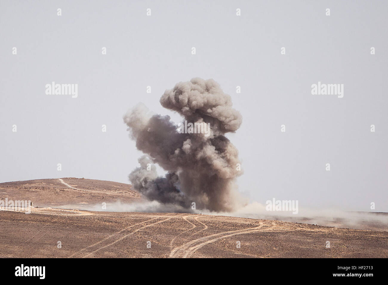 A U.S. Air Force F-16 jet drops a 500-pound bomb during a combined arms ...