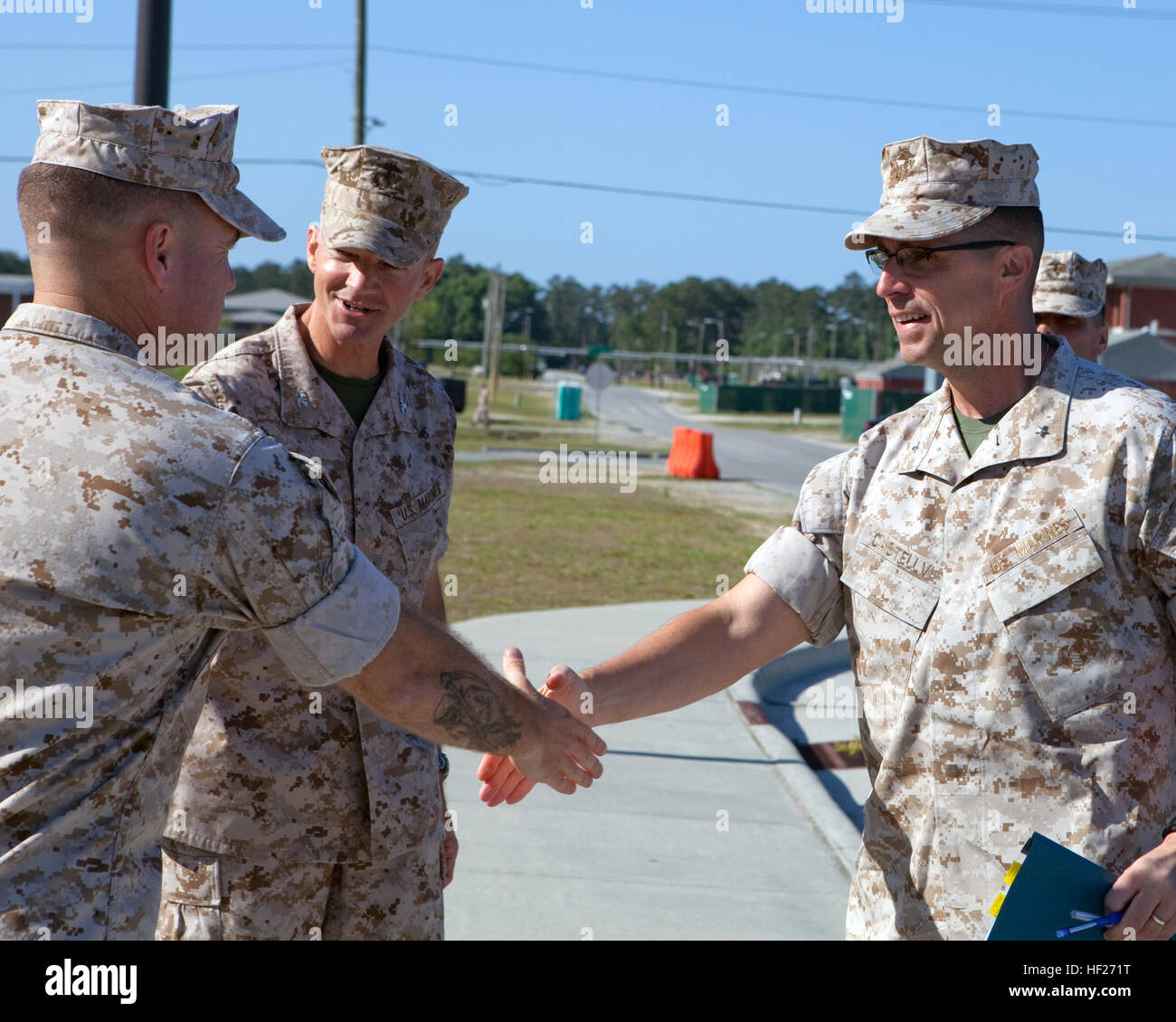 U.S. Marine Corps Col. Jeffrey T. Conner (center), commanding officer ...