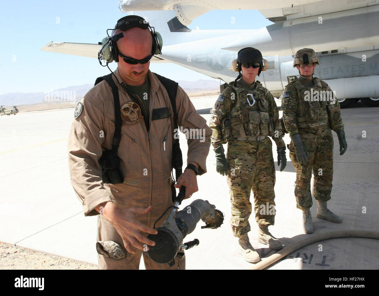 Sergeant Jacob Smith, a native of Moscow, Tenn., carefully inspects a ...