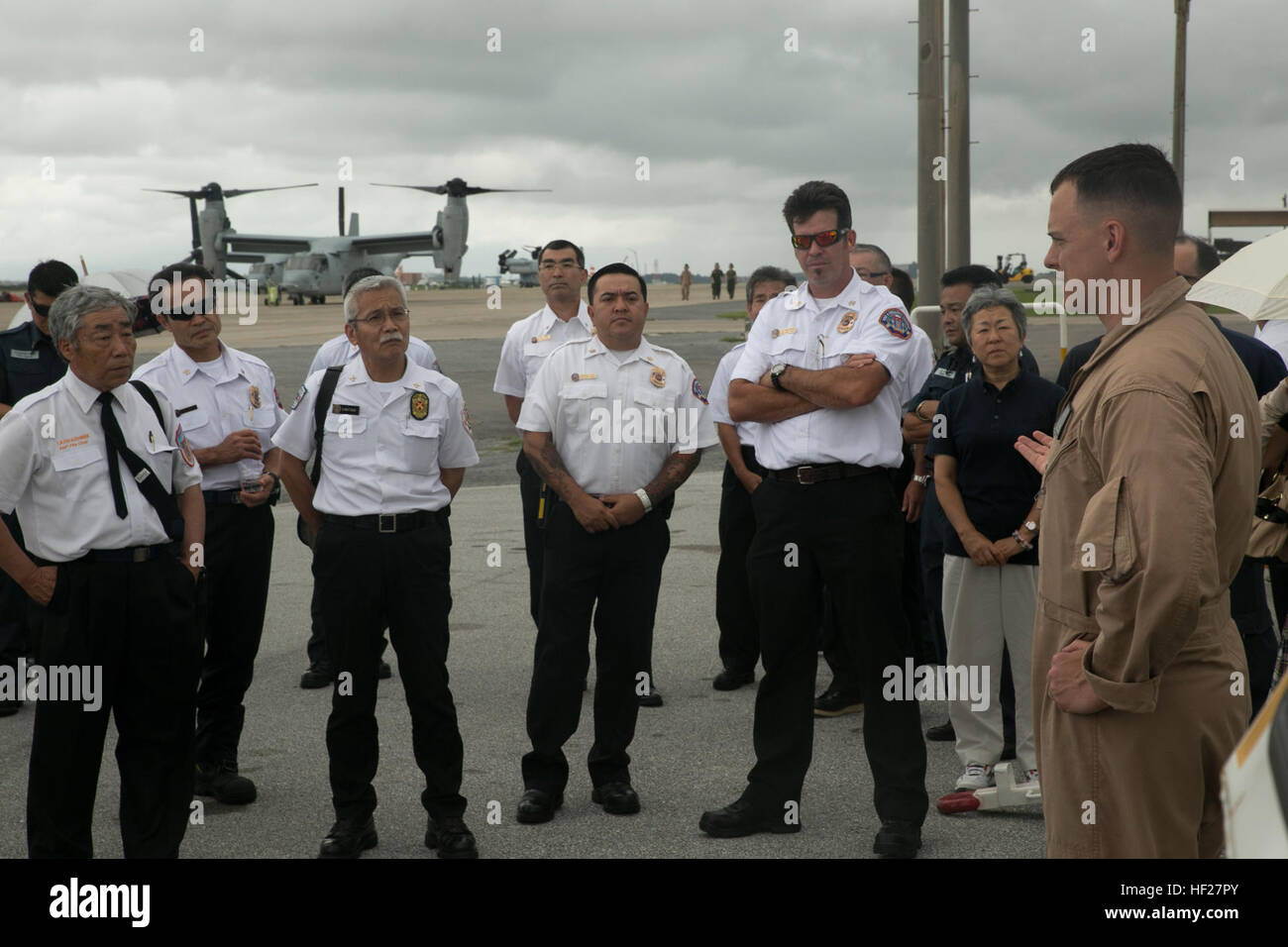 A Marine officer demonstrates the MV-22B Osprey and Bambi Bucket ...