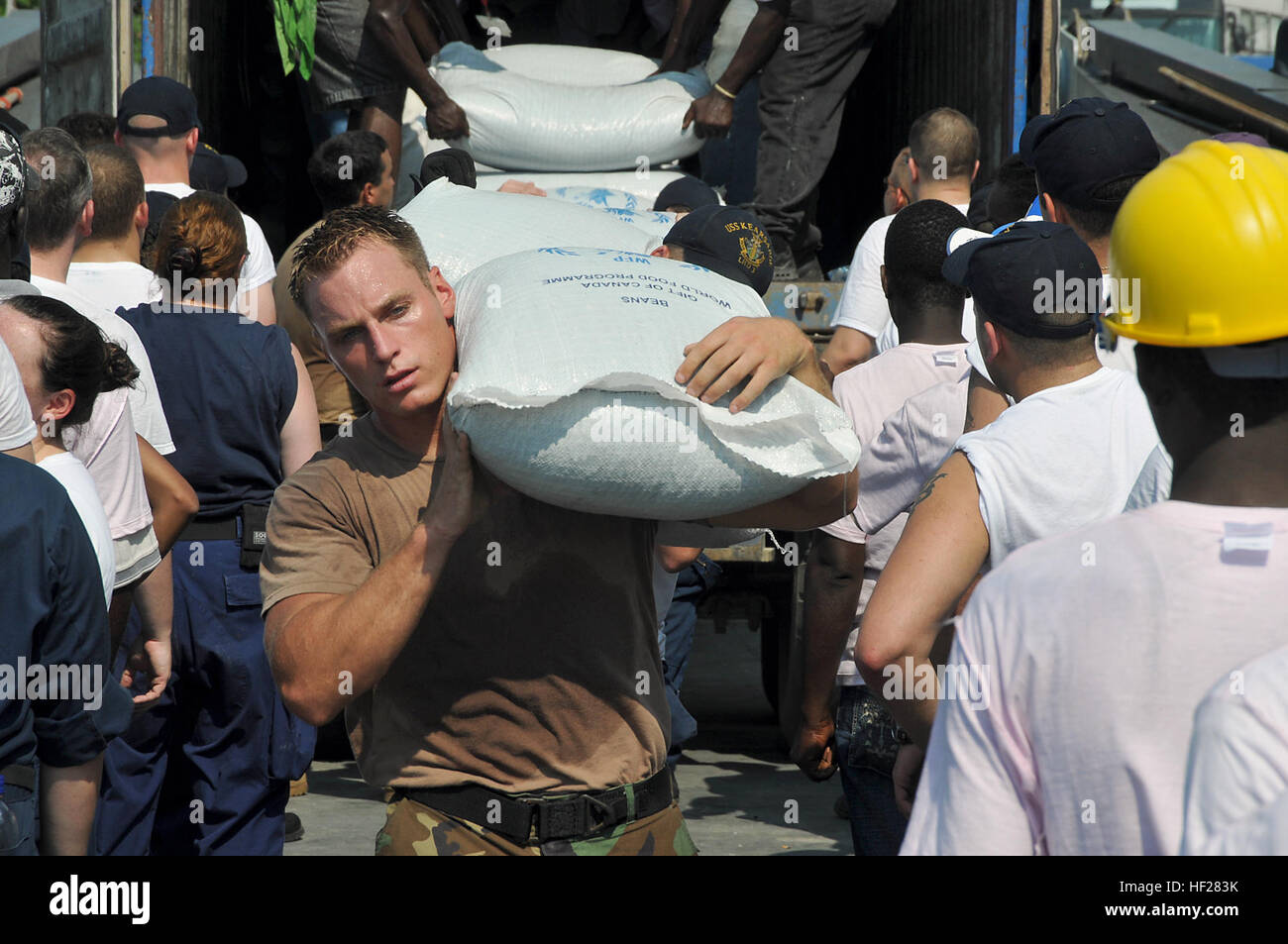 Seaman Mark McCaw, assigned to the amphibious assault ship USS ...