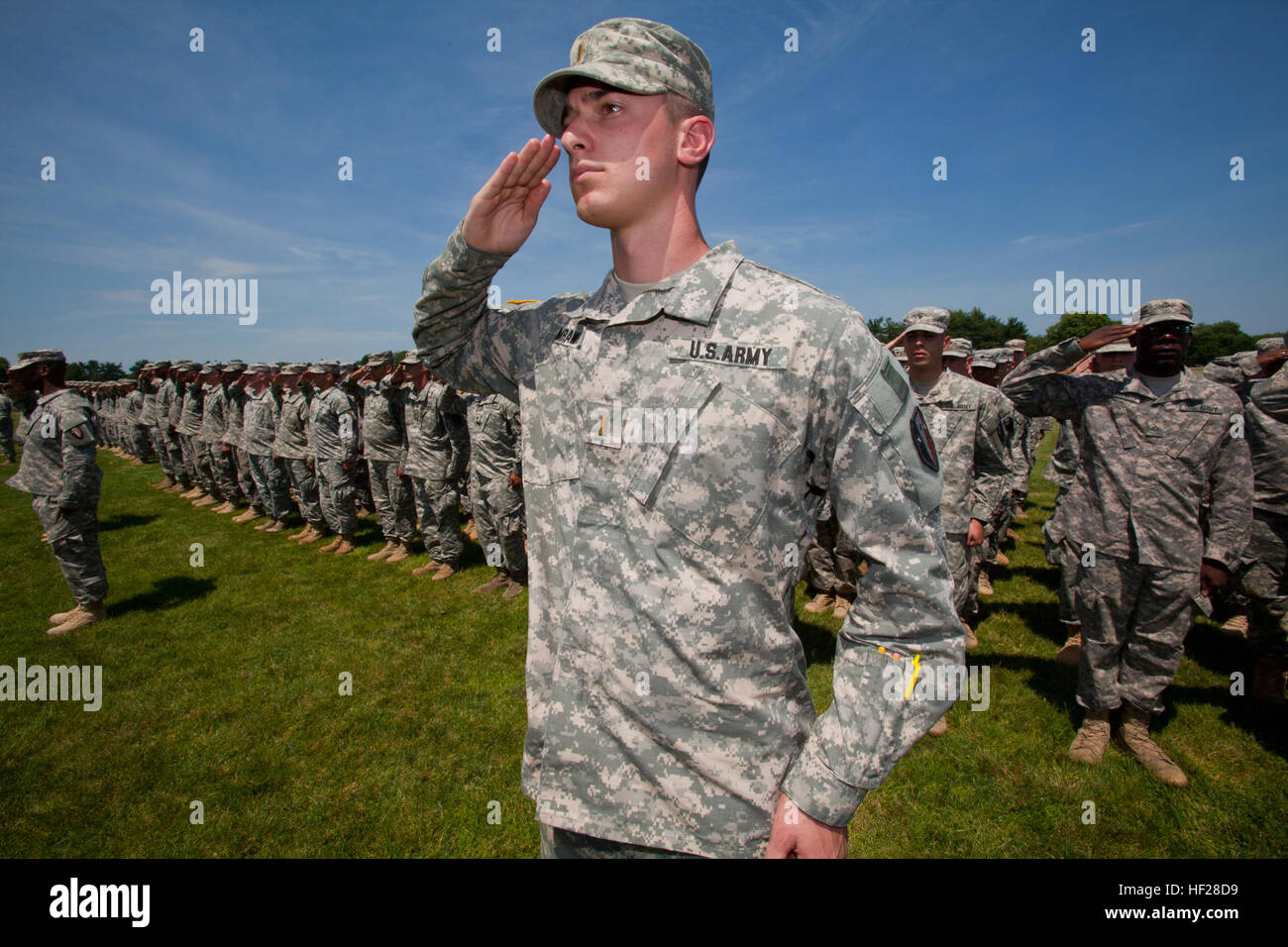 Army 2nd Lt. Michael Mraw, C Company, 1-114th Infantry, renders honors ...