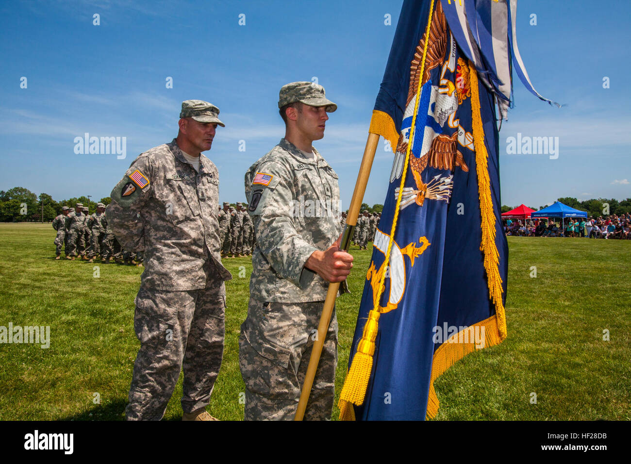 Command Sgt. Maj. Thomas J. Clark, left, and standard bearer Sgt. Adam ...