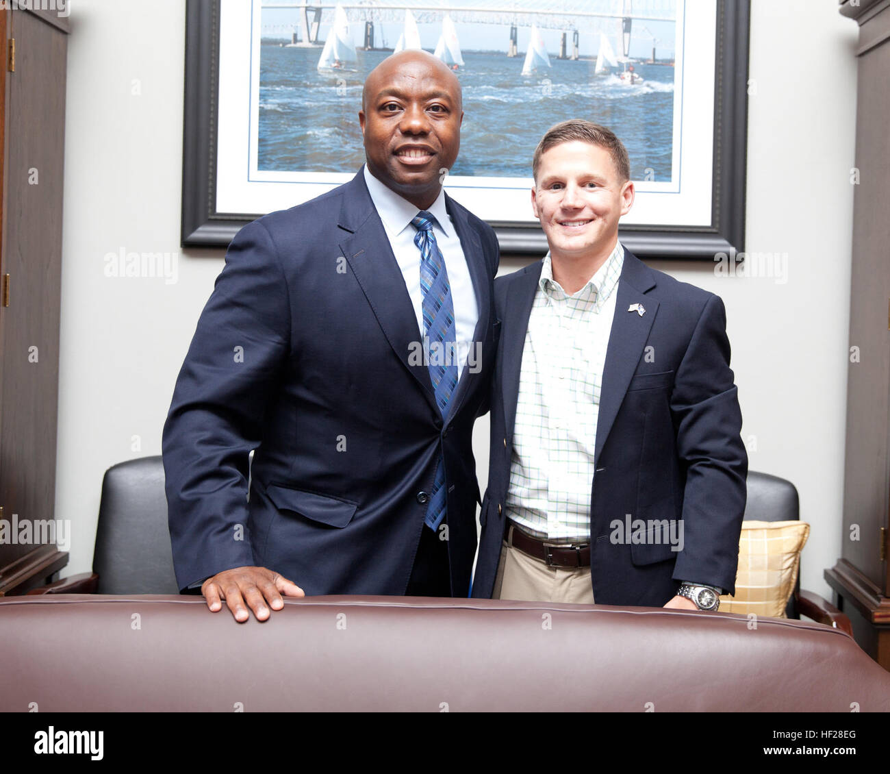 Retired U.S. Marine Corps Cpl. William Kyle Carpenter, right, poses for a photo during a tour of ...