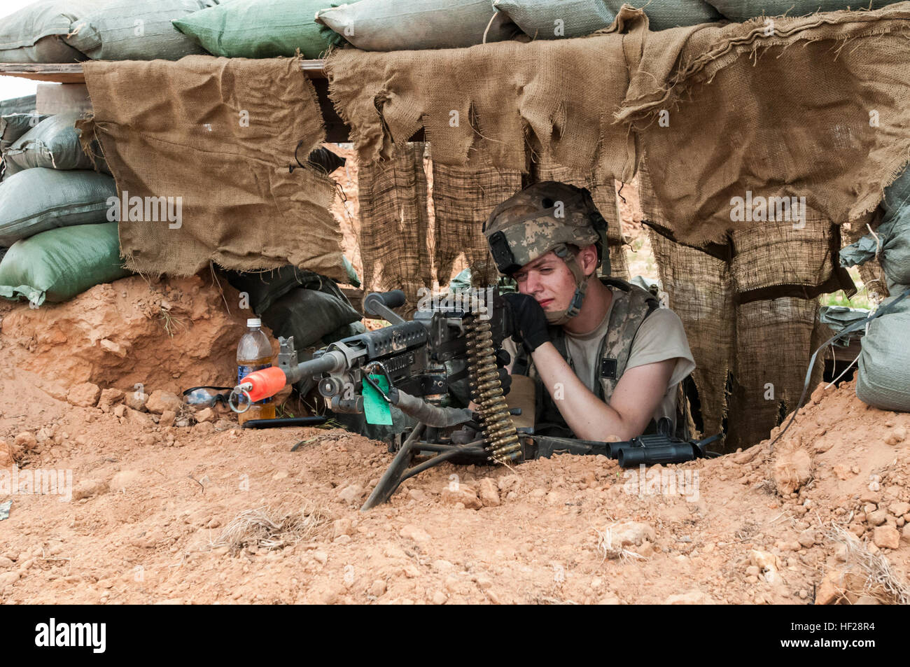 Pvt. Glenn Butts, a gunner with A.Battery, 1st Battalion, 101st Field ...