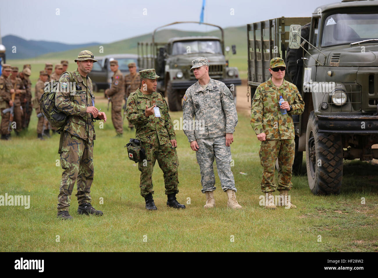 From left, training instructors Czech Republic Warrant Officer Martin ...