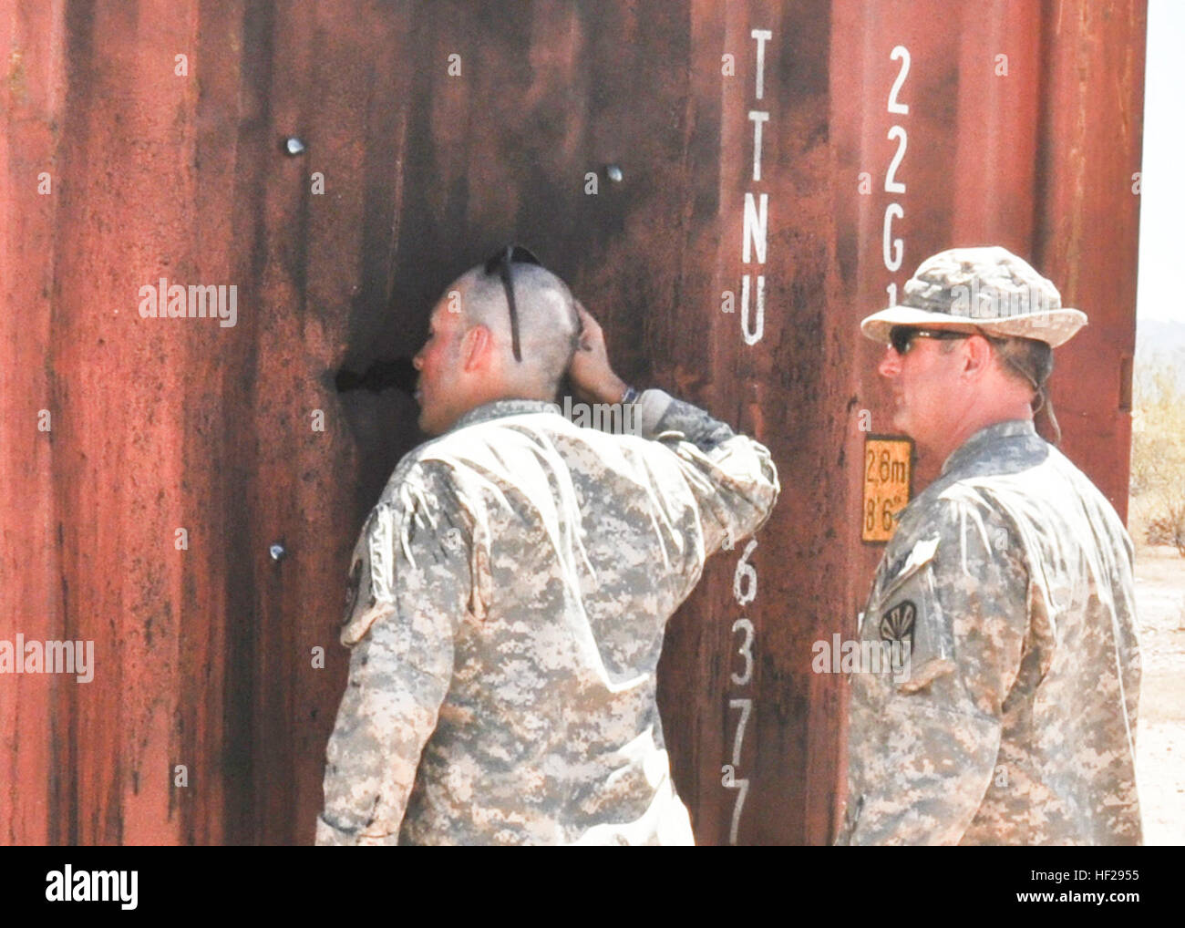 Army Sgt. Benito Garcia, left, and Spc. Robert Ianello of the Arizona ...