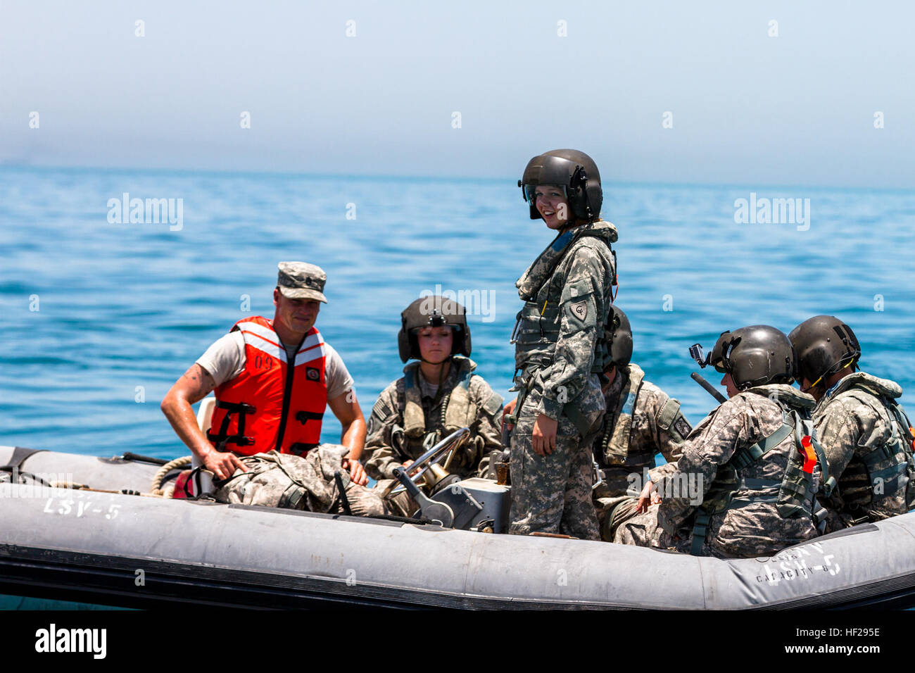 Soldiers of the 42nd Combat Aviation Brigade (CAB) work with Army ...