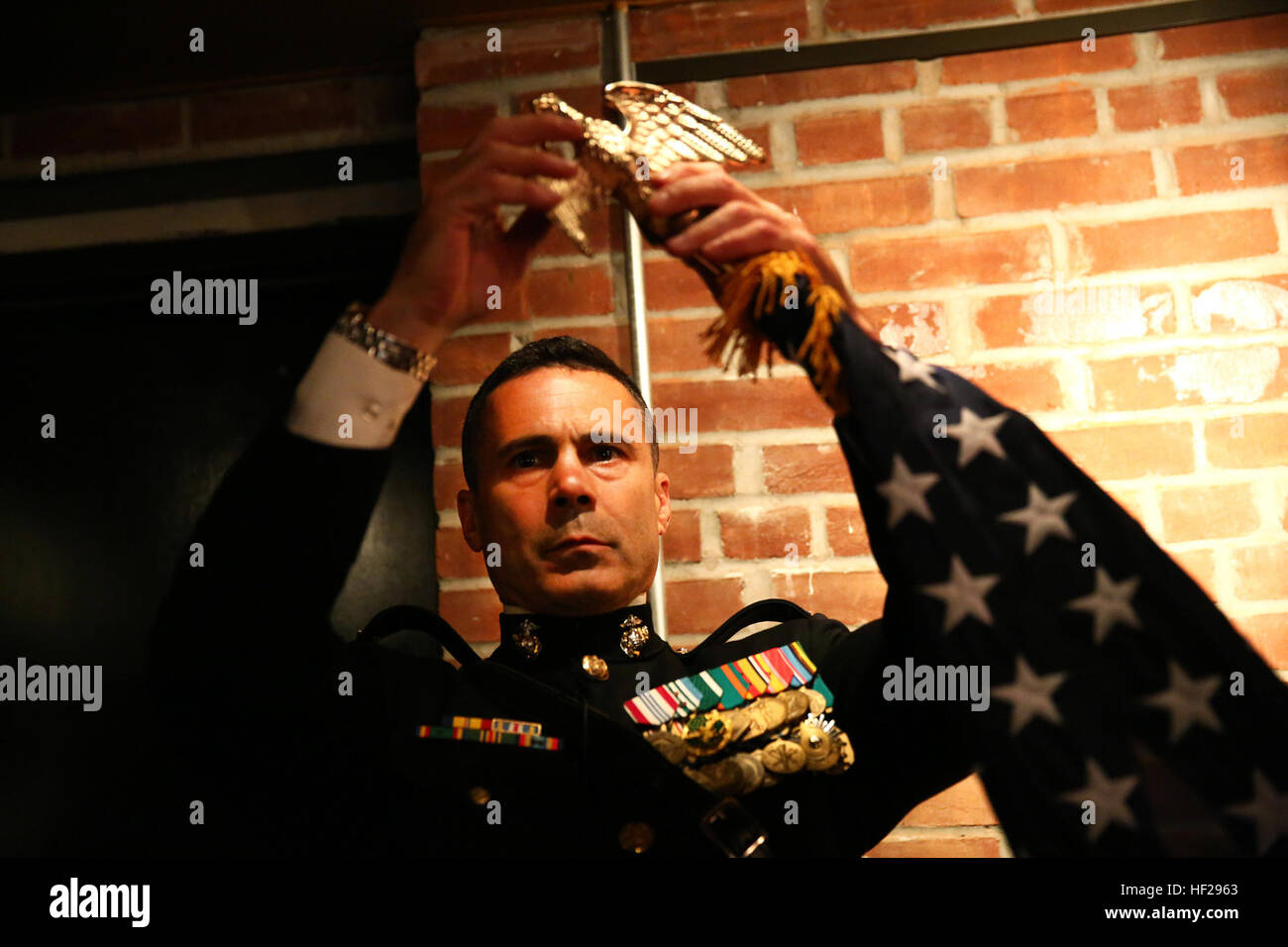 Colonel James Maxwell, New York state trooper and Marine, attaches the ...