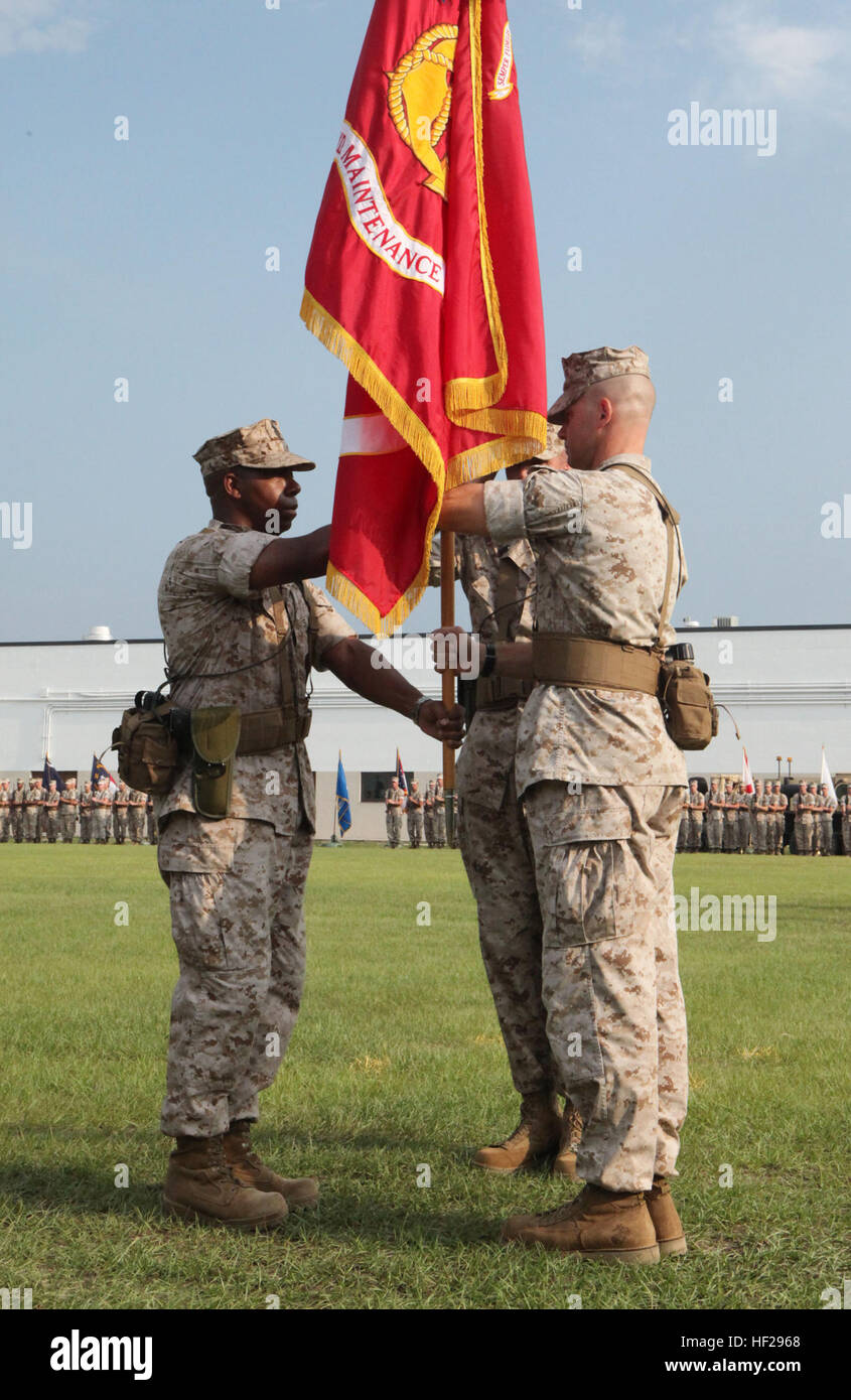 Lt. Col. Craig C. Clemans (right) transfers the colors of 2nd ...