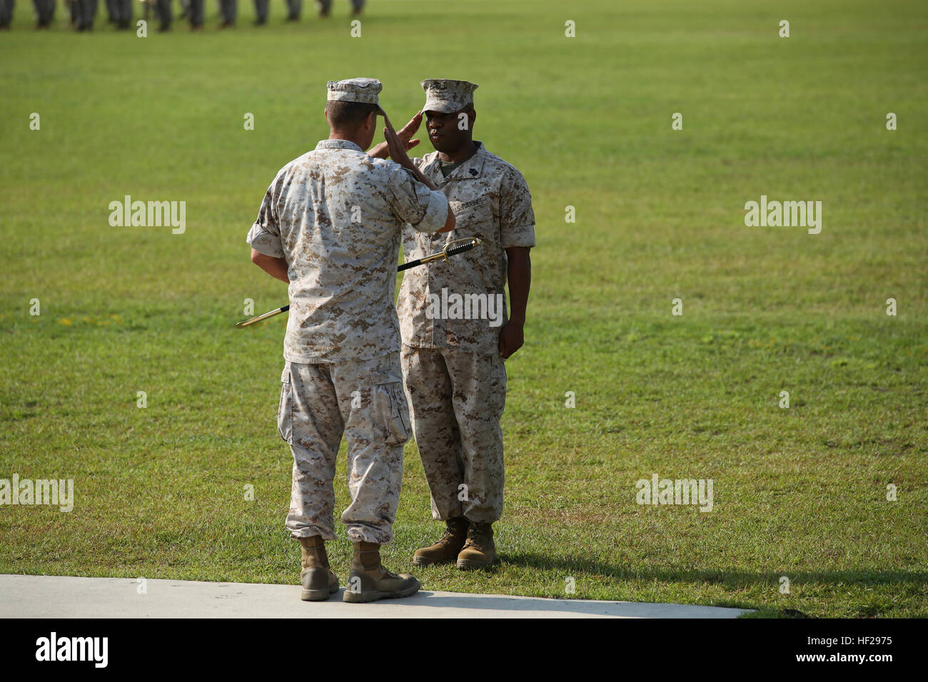 Sergeant Major John W. Scott salutes Maj. Gen. Mark A. Clark, commander ...