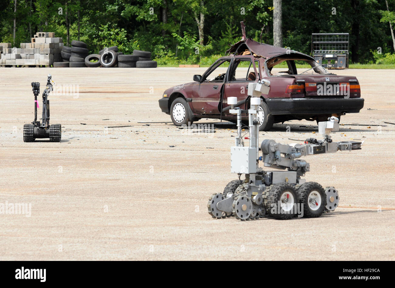 Explosive Ordnance Disposal personnel from 202nd EOD Company use robots ...