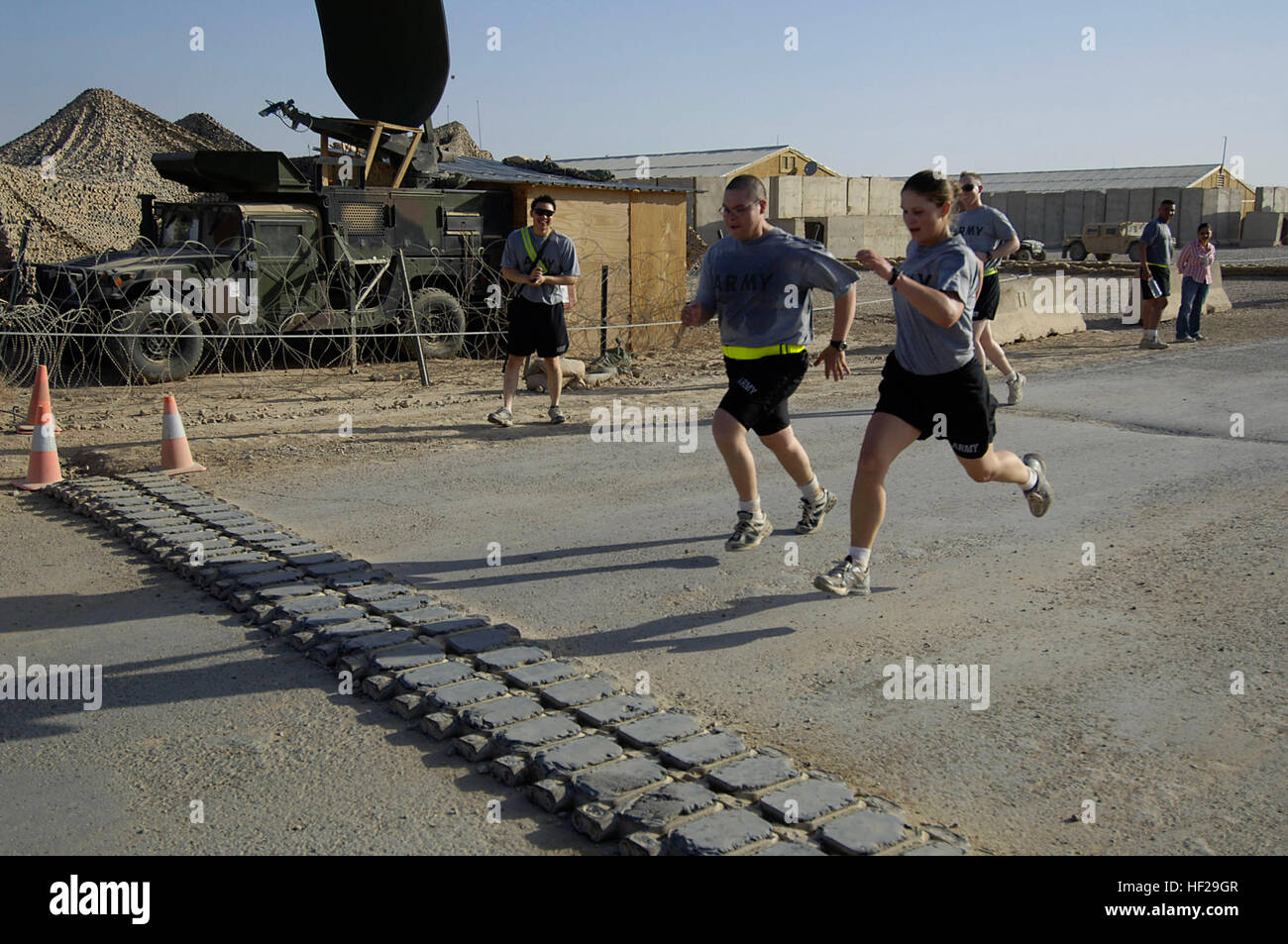 U.S. Soldiers from 2nd Brigade Combat Team, 1st Armored Division, race ...