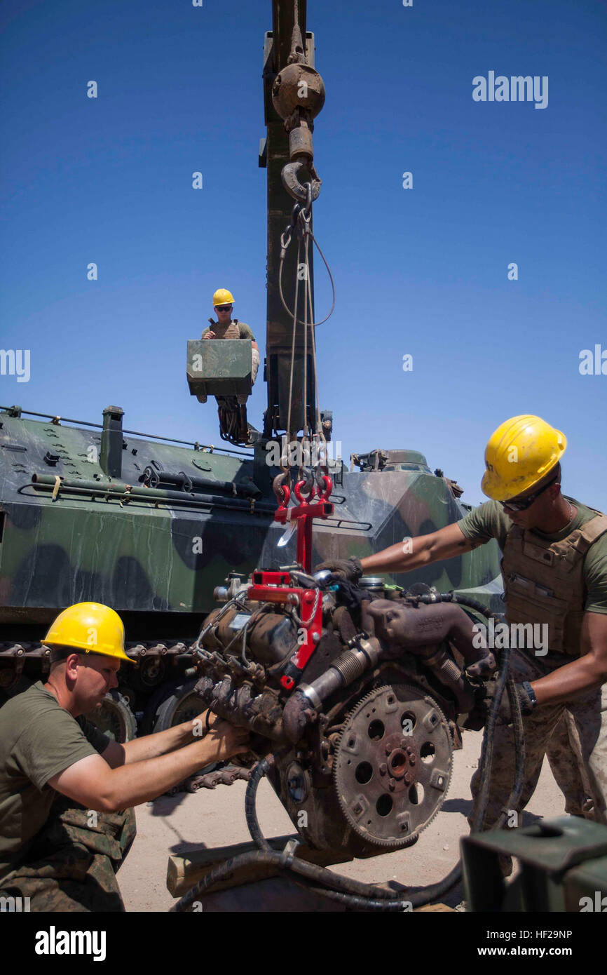U.S. Marine Corps Sgt. Billy Yon, left, Combat Logistics Battalion (CLB ...