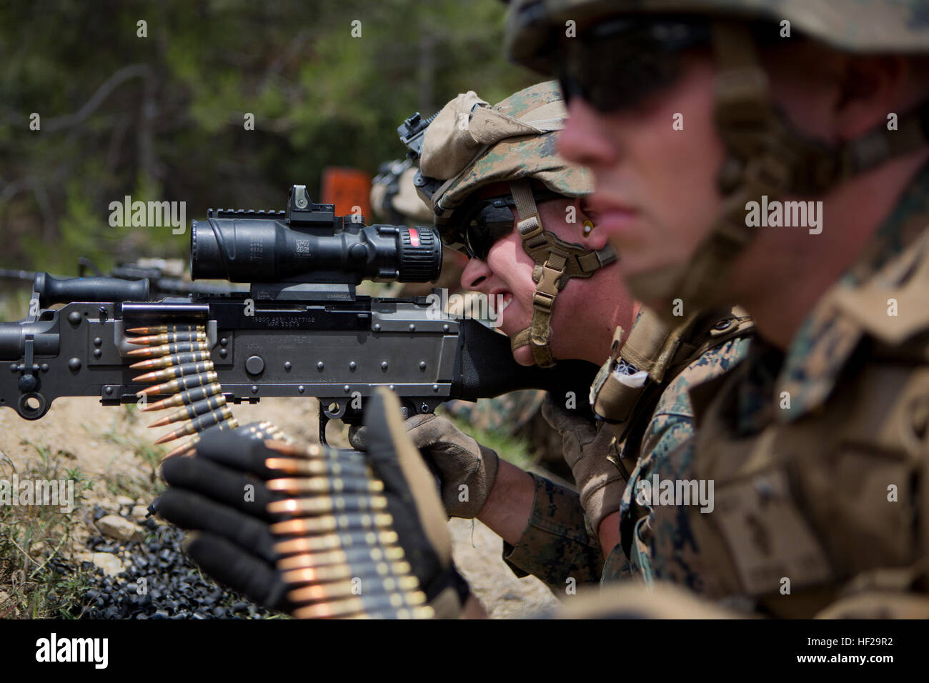 U.S. Marines fire a M240B machine gun during a military bilateral ...