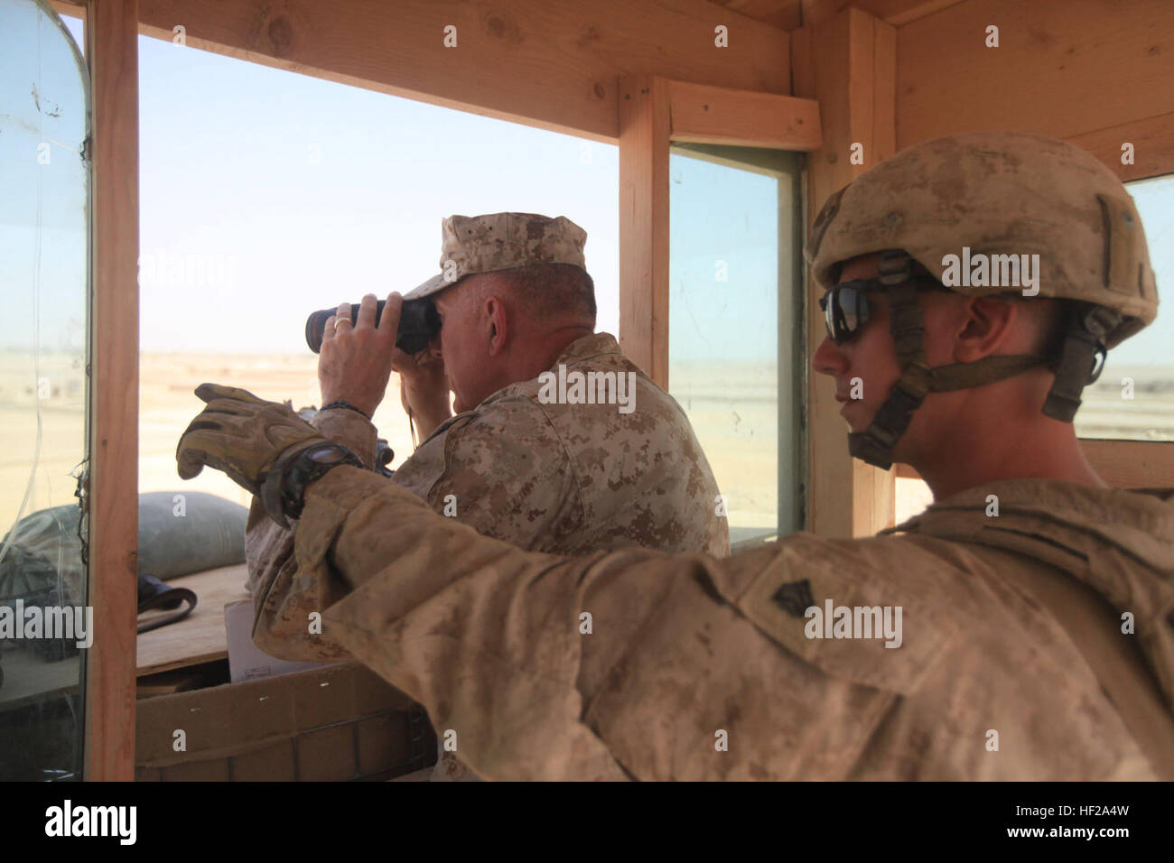 Gen. James T. Conway, the commandant of the Marine Corps, looks through ...