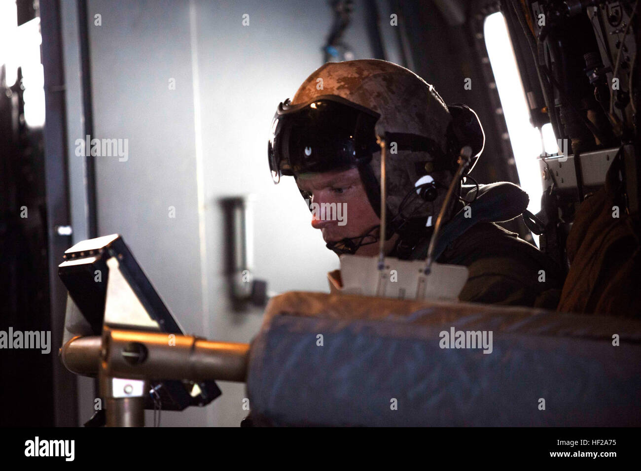 VMX-22 Marines conduct operational tests aboard an MV-22 Osprey using ...