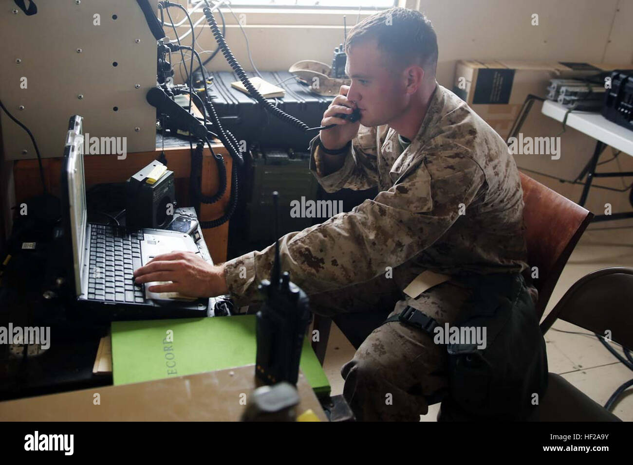 Corporal William Nash uses a radio during training at Marine Corps ...