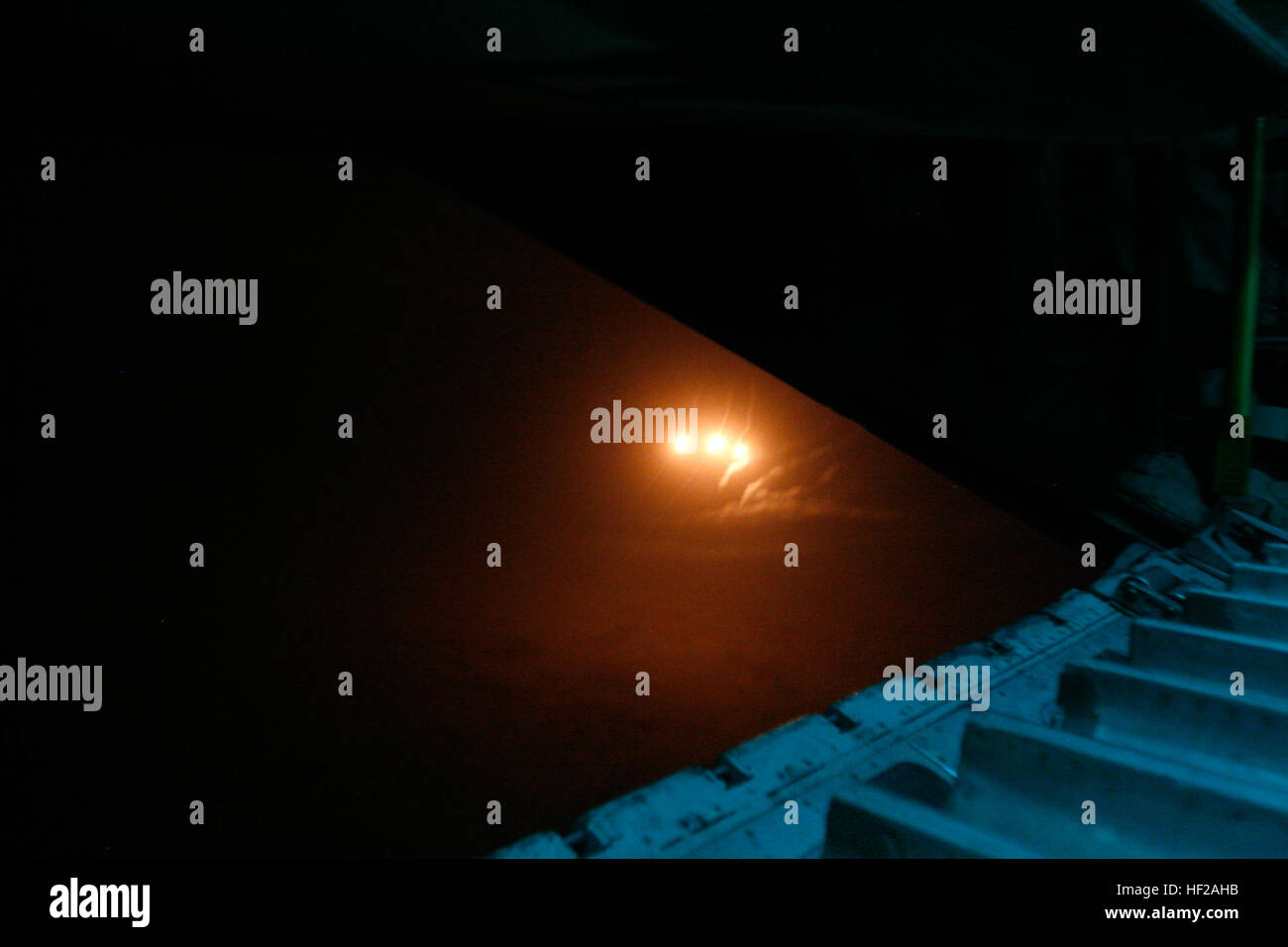 Flares dropped out of a KC-130J by Marines with Marine Aerial Refueling Transportation Squadron ...