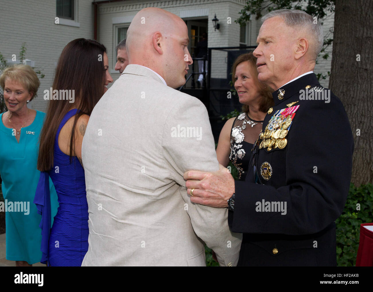 The Commandant of the U.S. Marine Corps, Gen. James F. Amos, right ...
