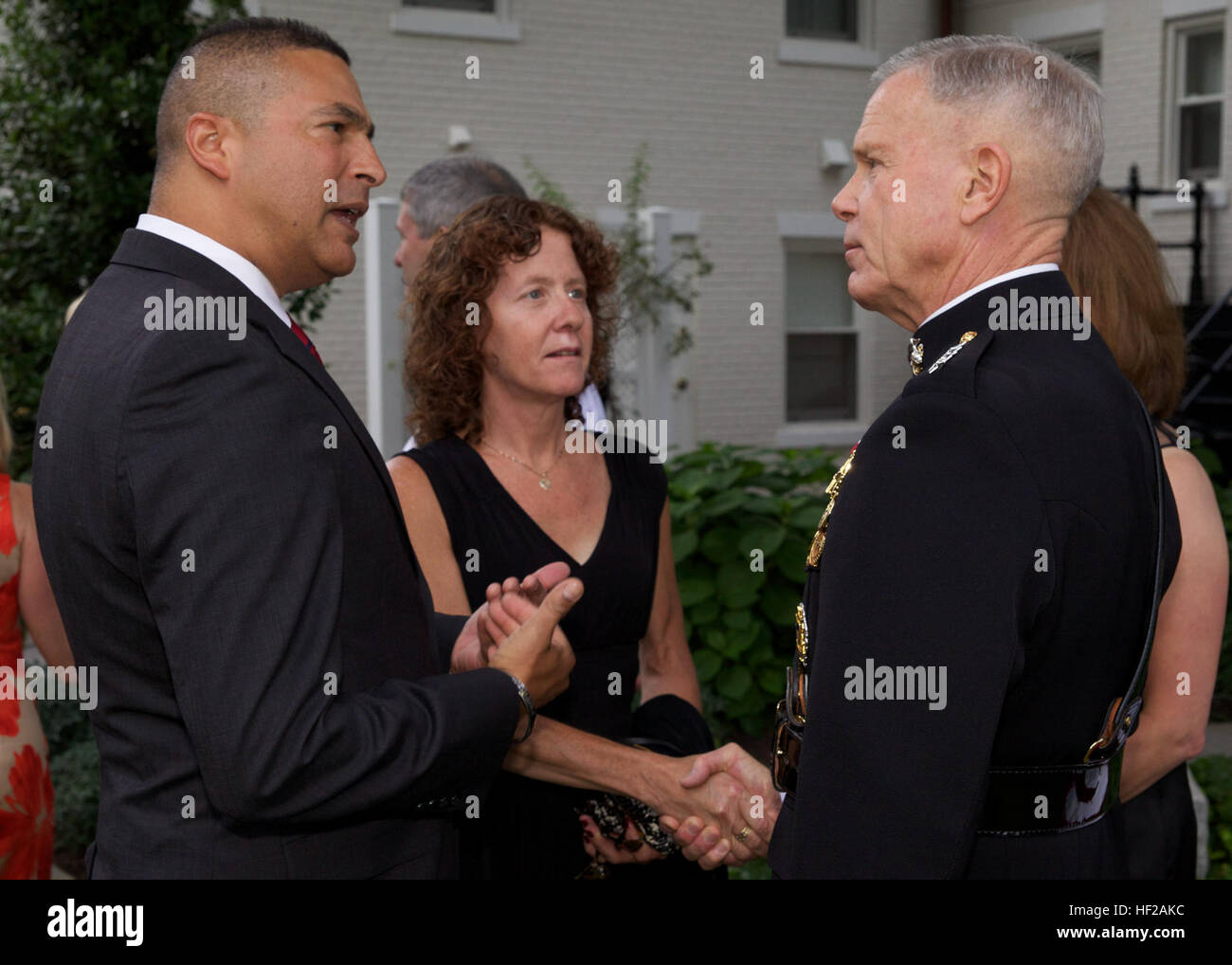 The Commandant of the U.S. Marine Corps, Gen. James F. Amos, right ...