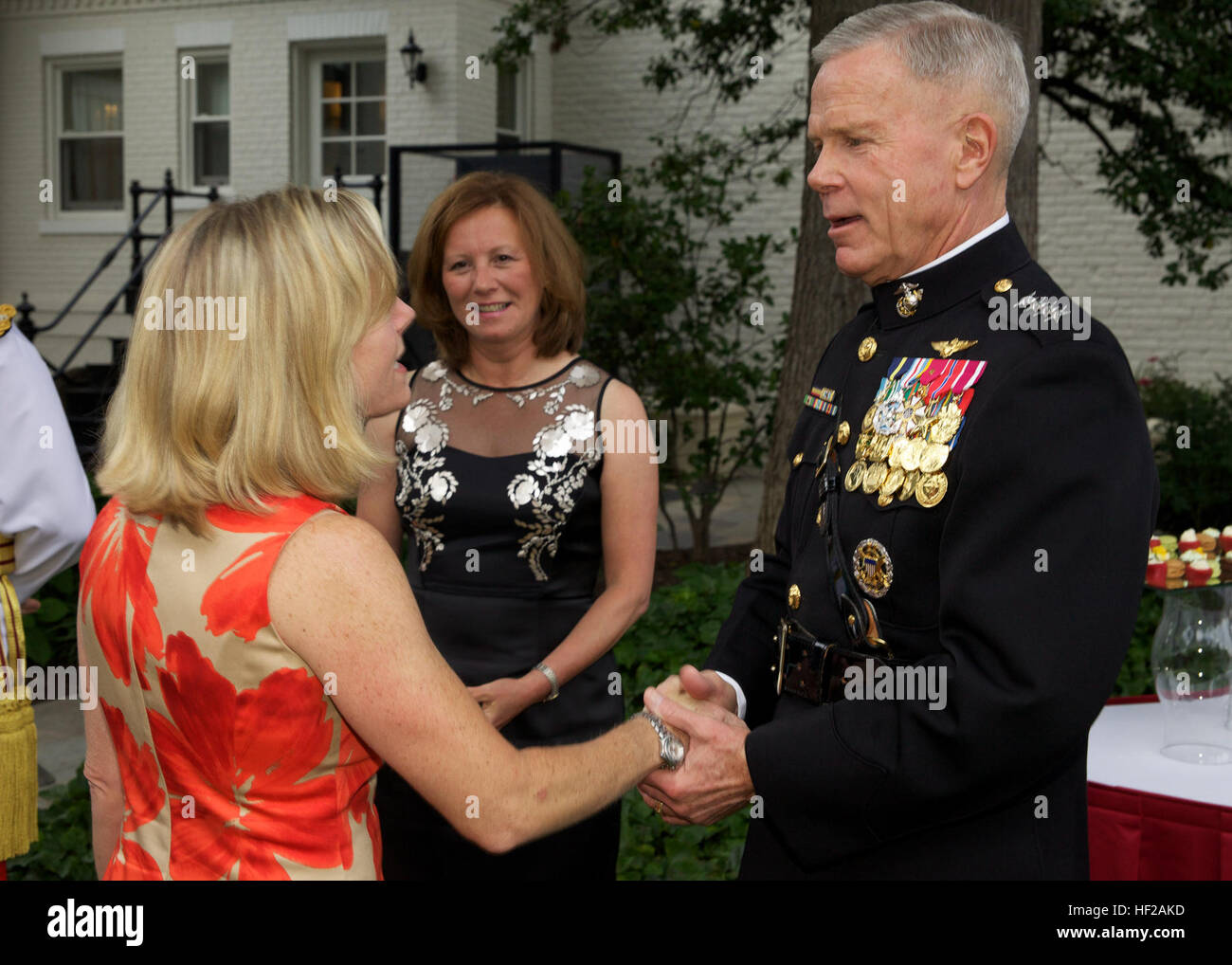 The Commandant of the U.S. Marine Corps, Gen. James F. Amos, right ...