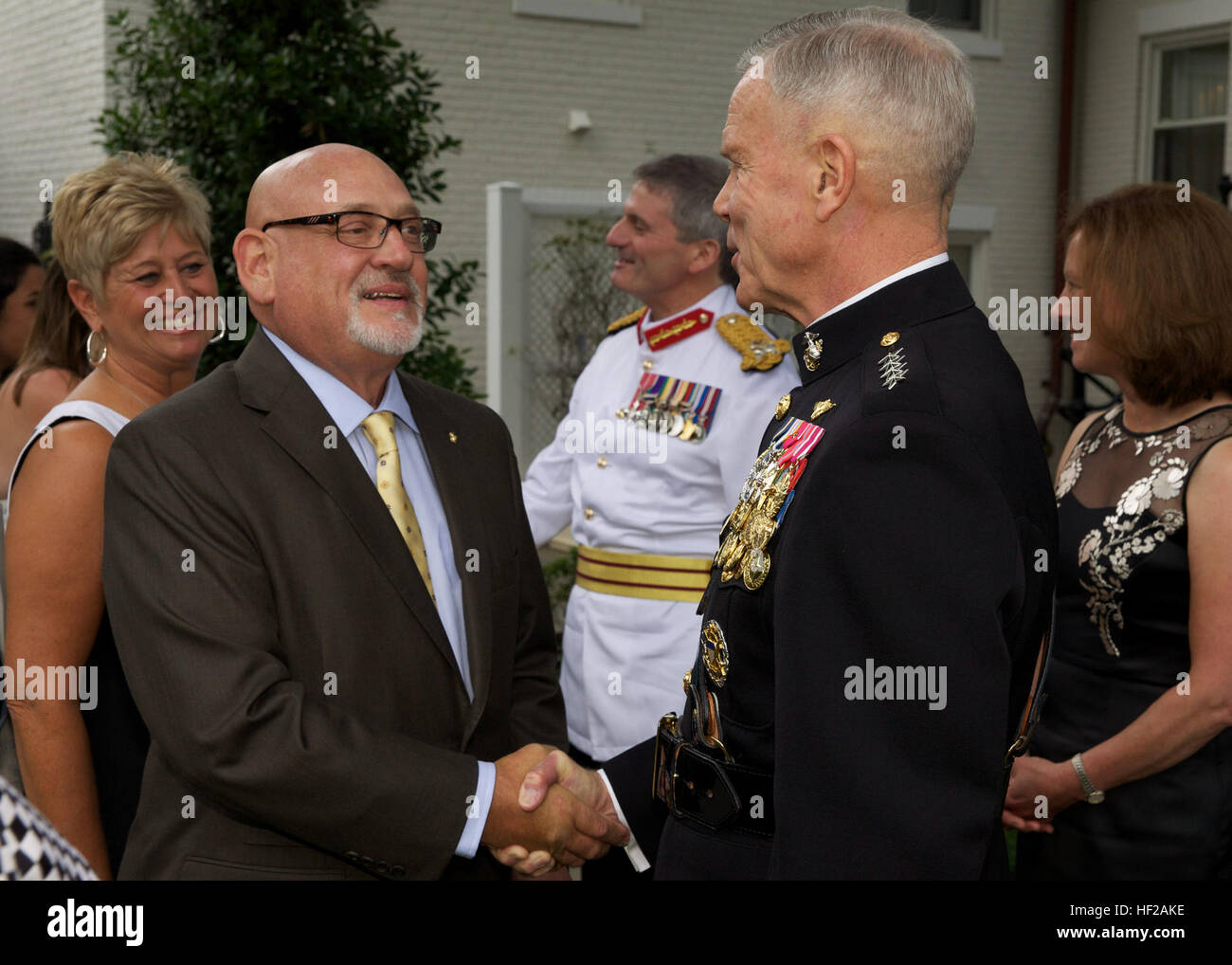 The Commandant of the U.S. Marine Corps, Gen. James F. Amos, right ...