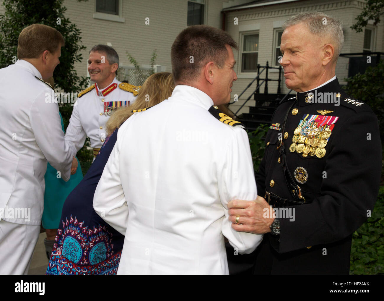 The Commandant of the U.S. Marine Corps, Gen. James F. Amos, right ...