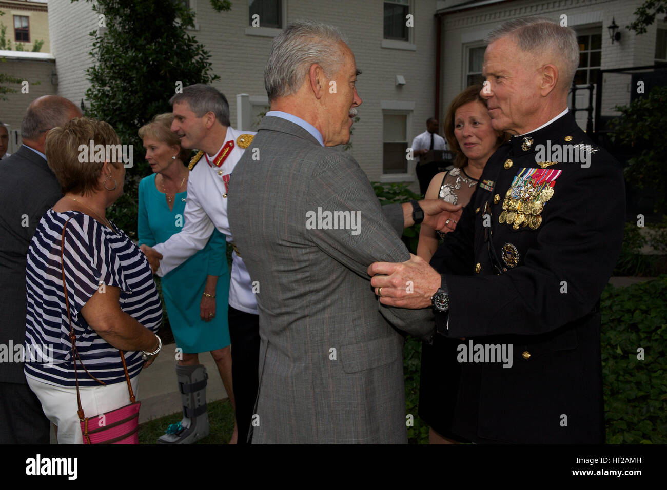The Commandant of the U.S. Marine Corps, Gen. James F. Amos, right ...