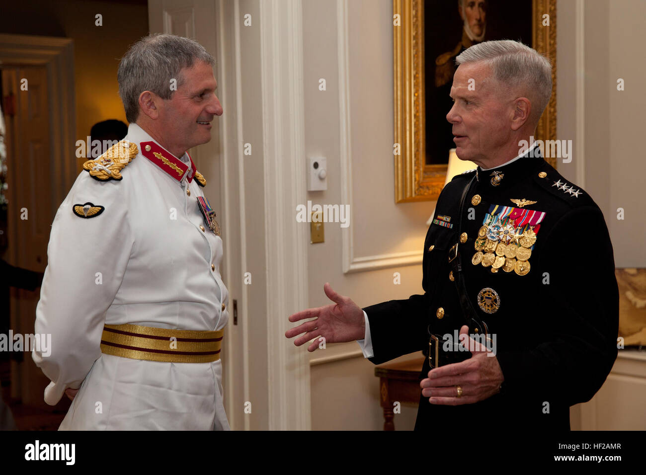 The Commandant of the Marine Corps, Gen. James F. Amos, right, greets ...