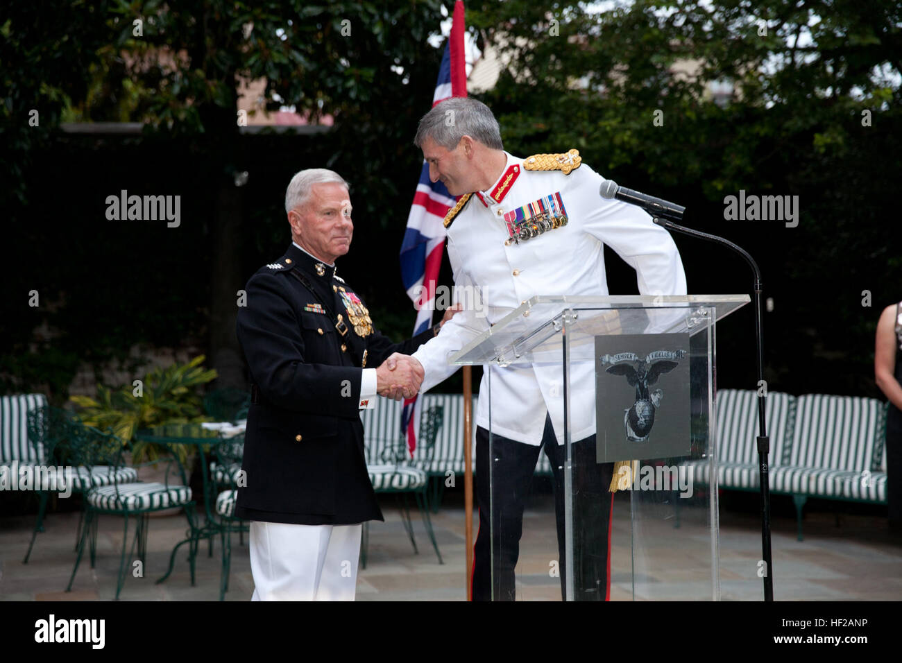 The Commandant of the Marine Corps, Gen. James F. Amos, left, shakes ...