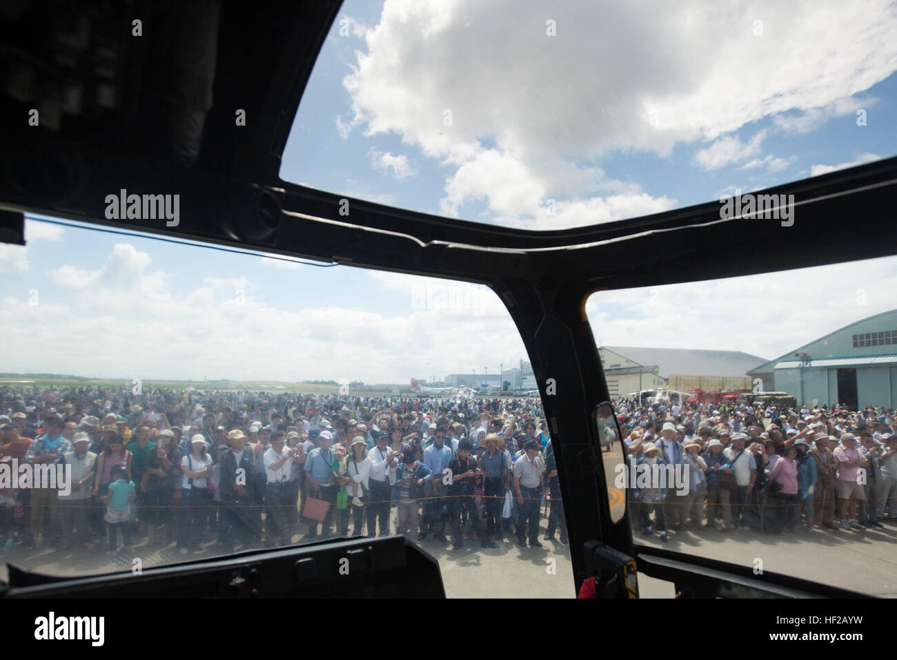 A view from inside the cockpit of MV-22 Osprey shows the large crowds ...