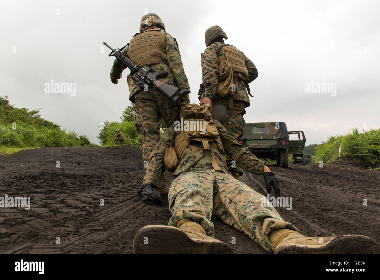 Marines with Combat Logistics Company 36 Marines drag a causality of an ...
