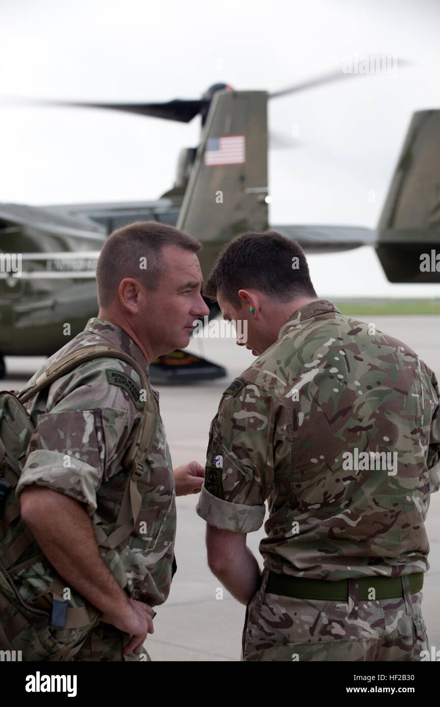 British Royal Marine Attache Col. Al Lister, left, speaks with Maj ...