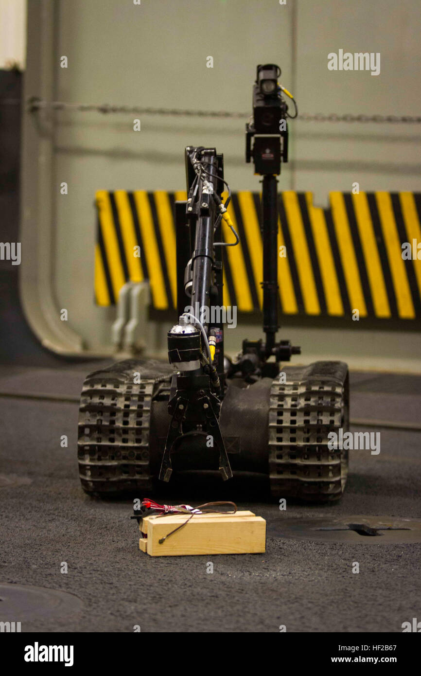 An MK 2 MTRS (Talon) robot arranges objects by size during an explosive ...