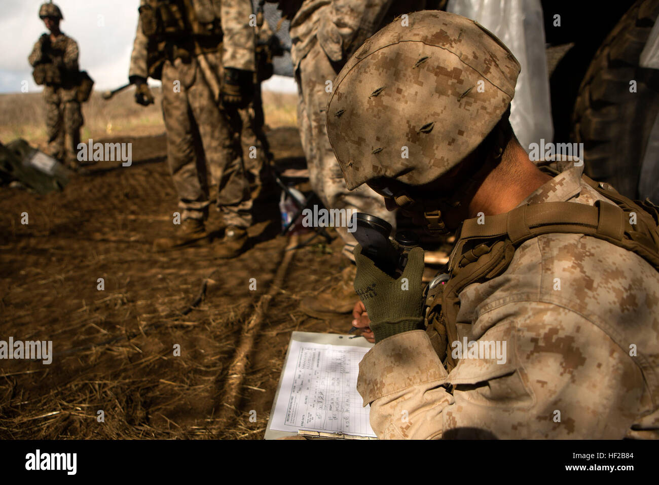 U.S. Marine Corps Lance Cpl. Robert Modar, a field artillery fire ...
