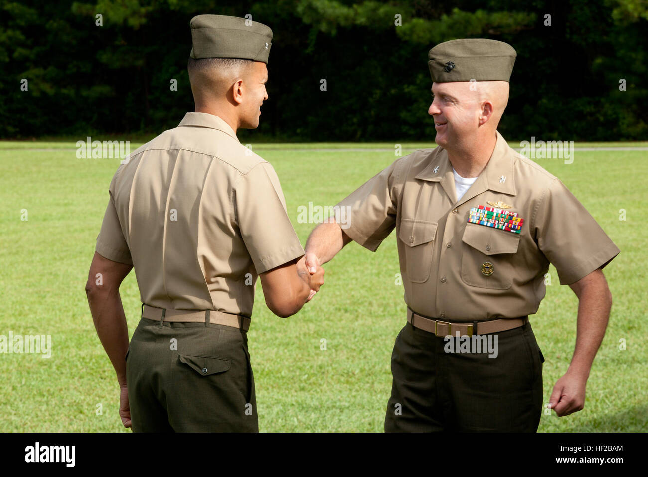 Lieutenant Colonel David E. Jones (left), oncoming Commanding Officer, Marine Corps Combat ...