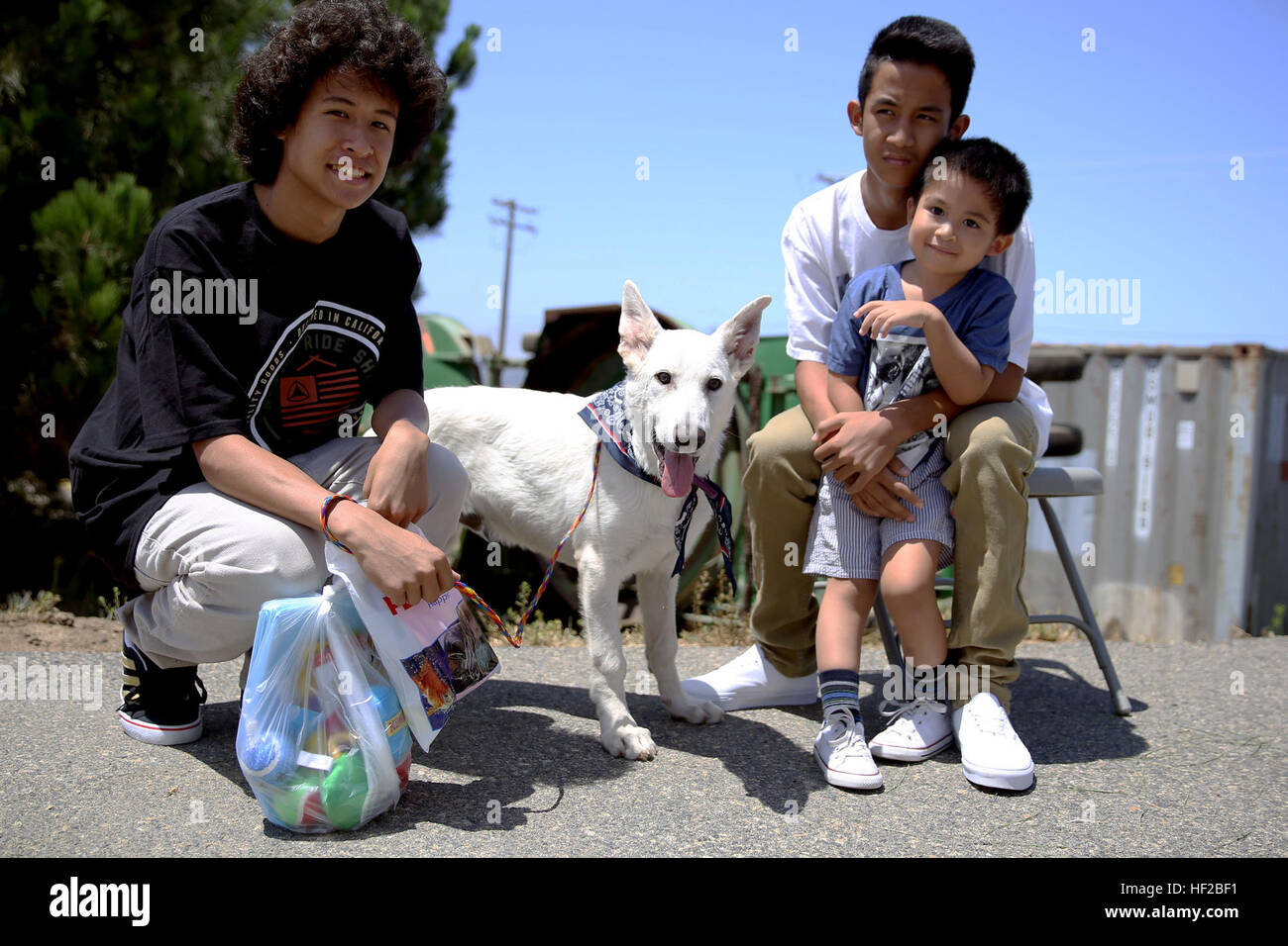 Brothers Jordan, 17, Jarrod, 14, and Jaden,4, are ready to take home ...