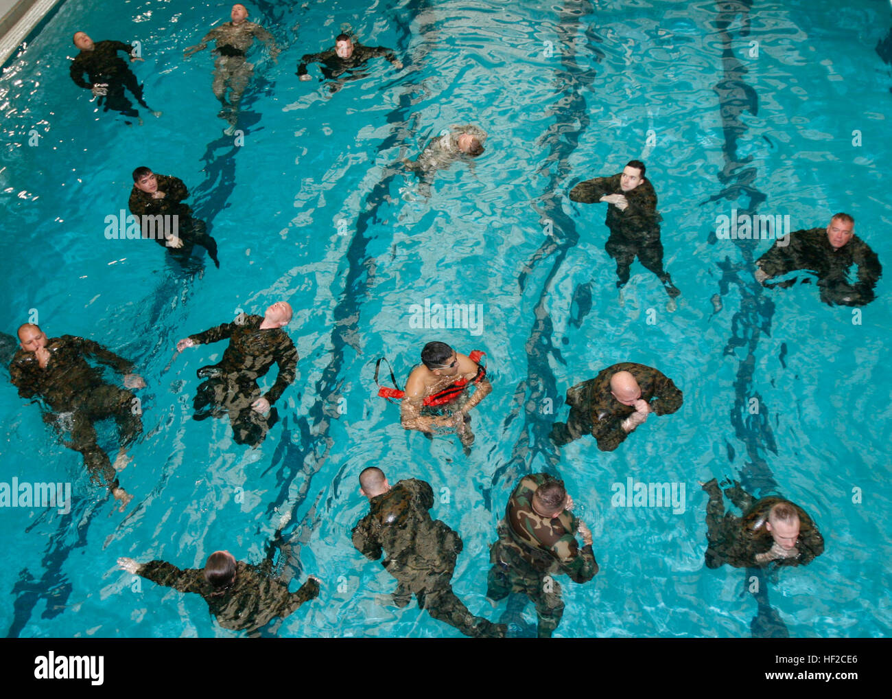 Marines with II Marine Expeditionary Force (Forward) tread water during ...