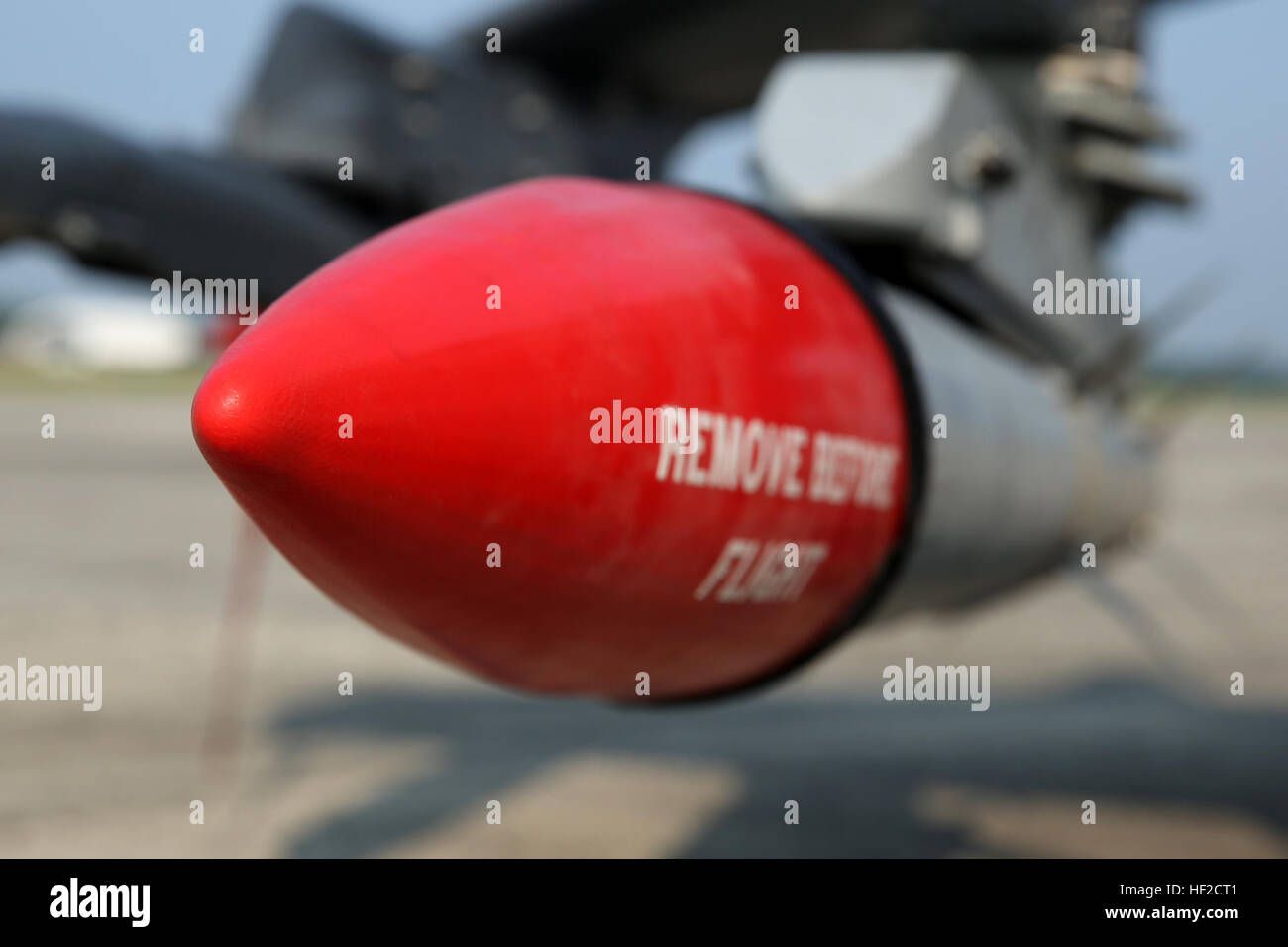 An AIM-120A advanced medium-range air-to-air missile is secured aboard ...