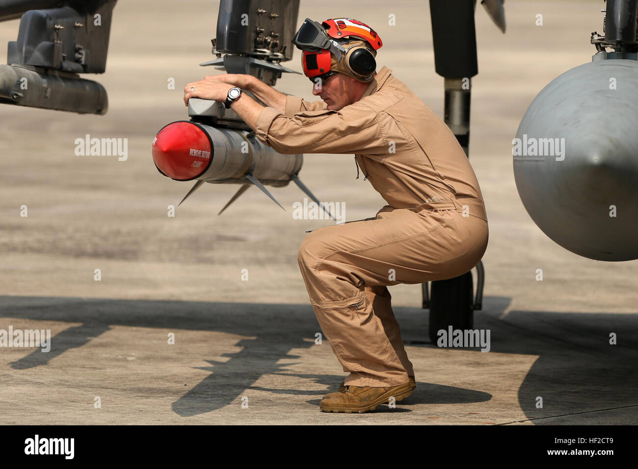 Gunnery Sgt. Robert J. McElmurry conducts a pre-flight safety check of ...