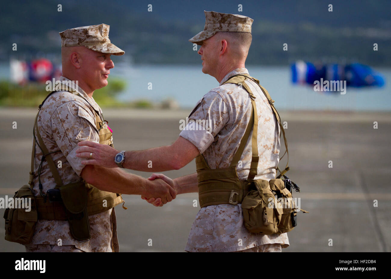 U.S. Marine Corps Col. Brian P. Annichiarico (left) and Col. Eric E ...